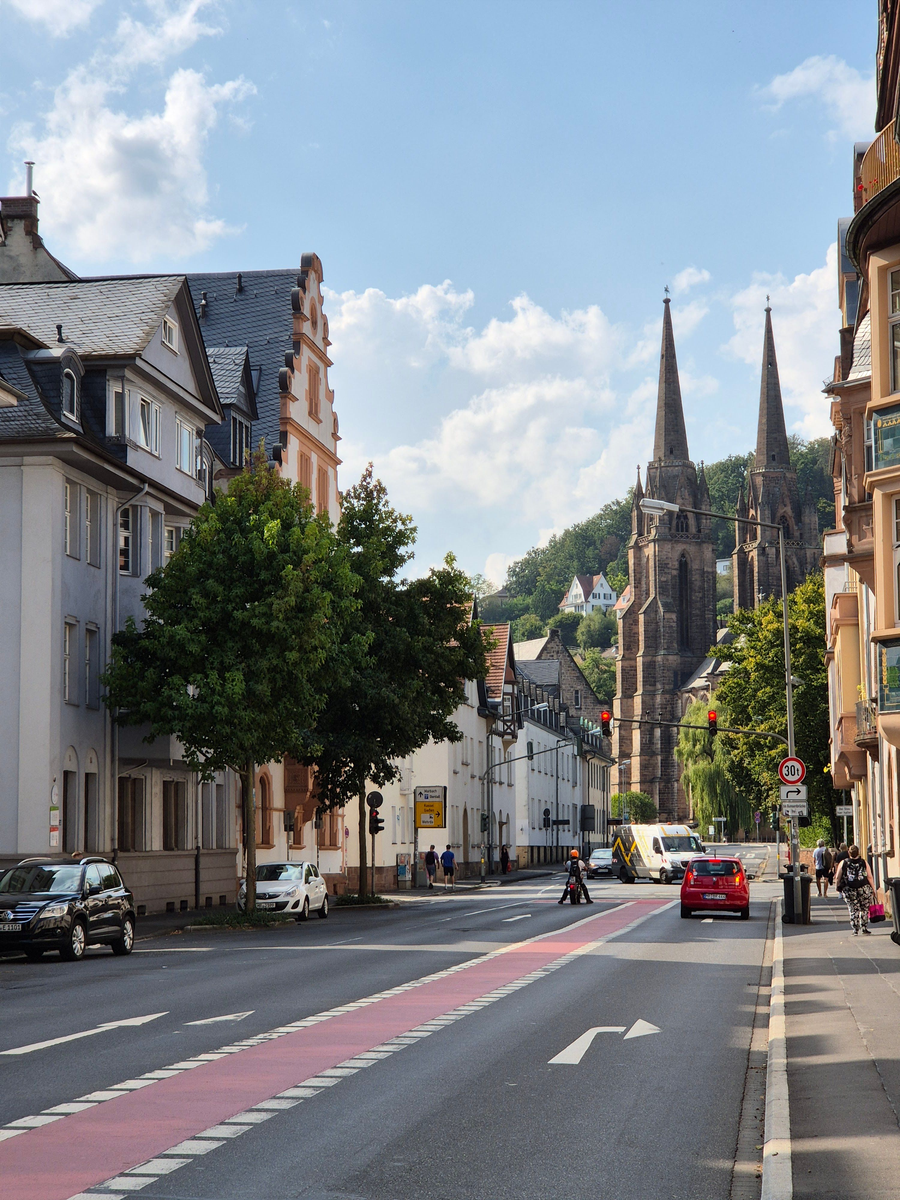 Scenic Urban Street with Historic Church View · Free Stock Photo