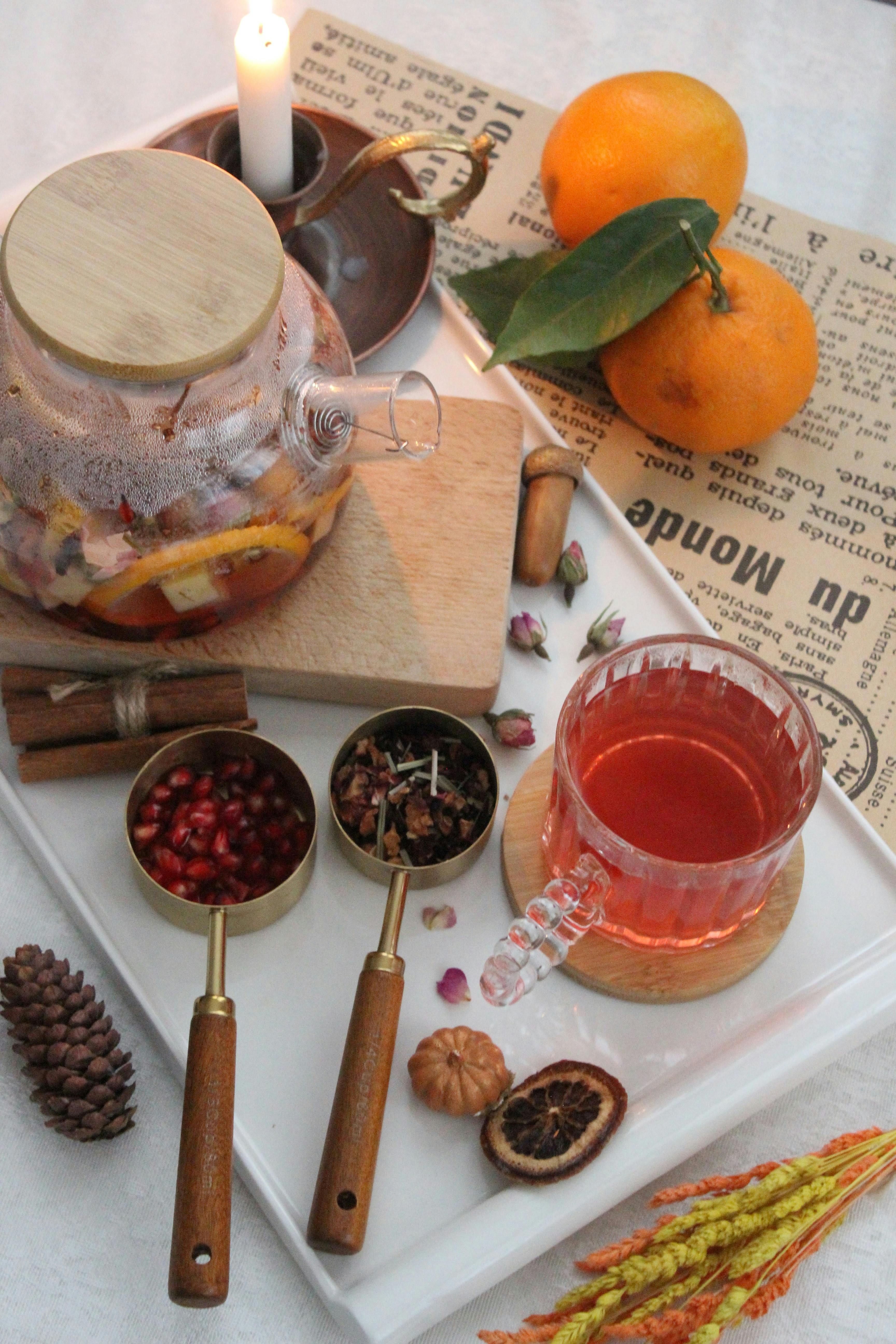 Cozy Winter Tea Setup with Fruits and Spices · Free Stock Photo