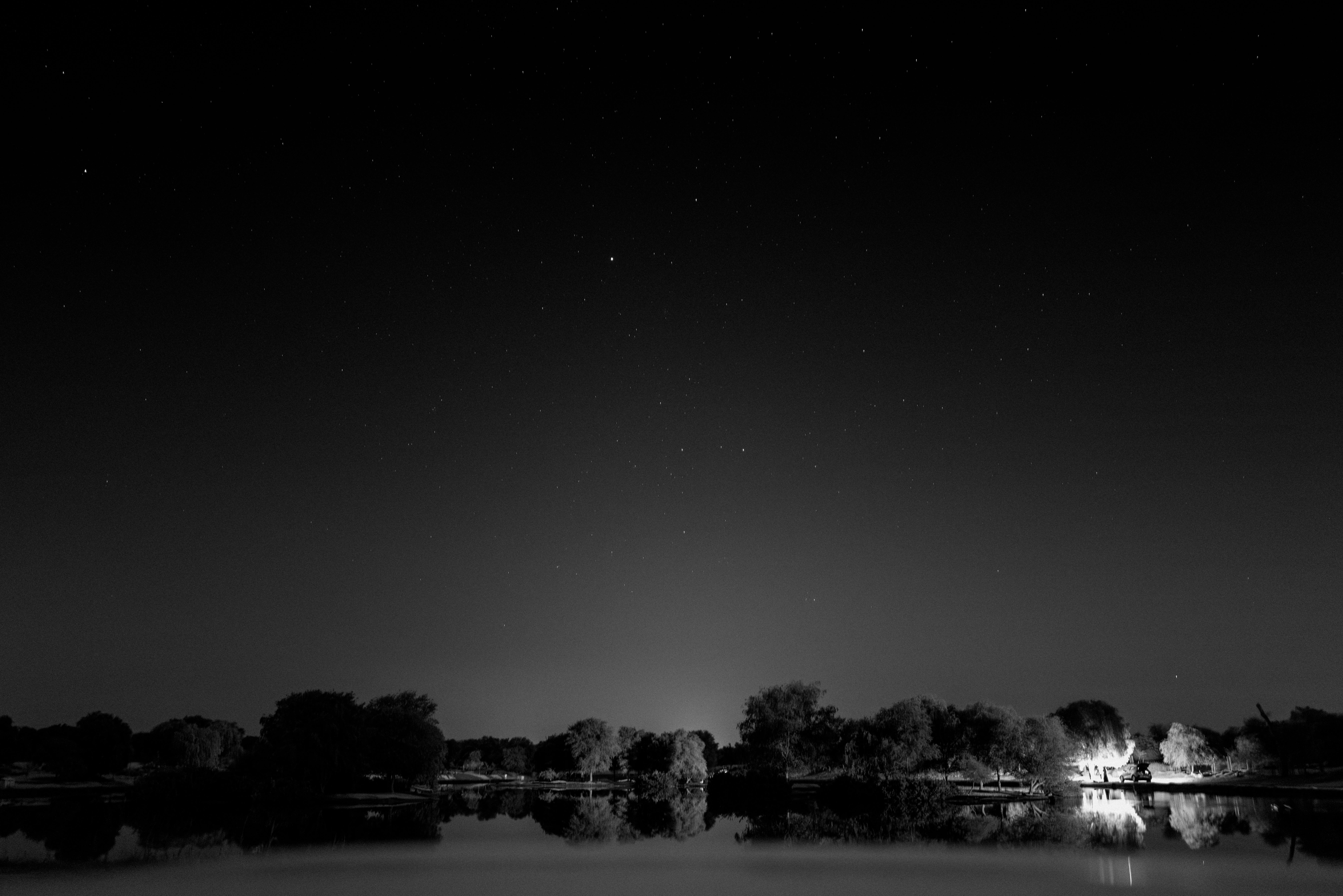 Black and White Starry Night Over Dubai Landscape · Free Stock Photo