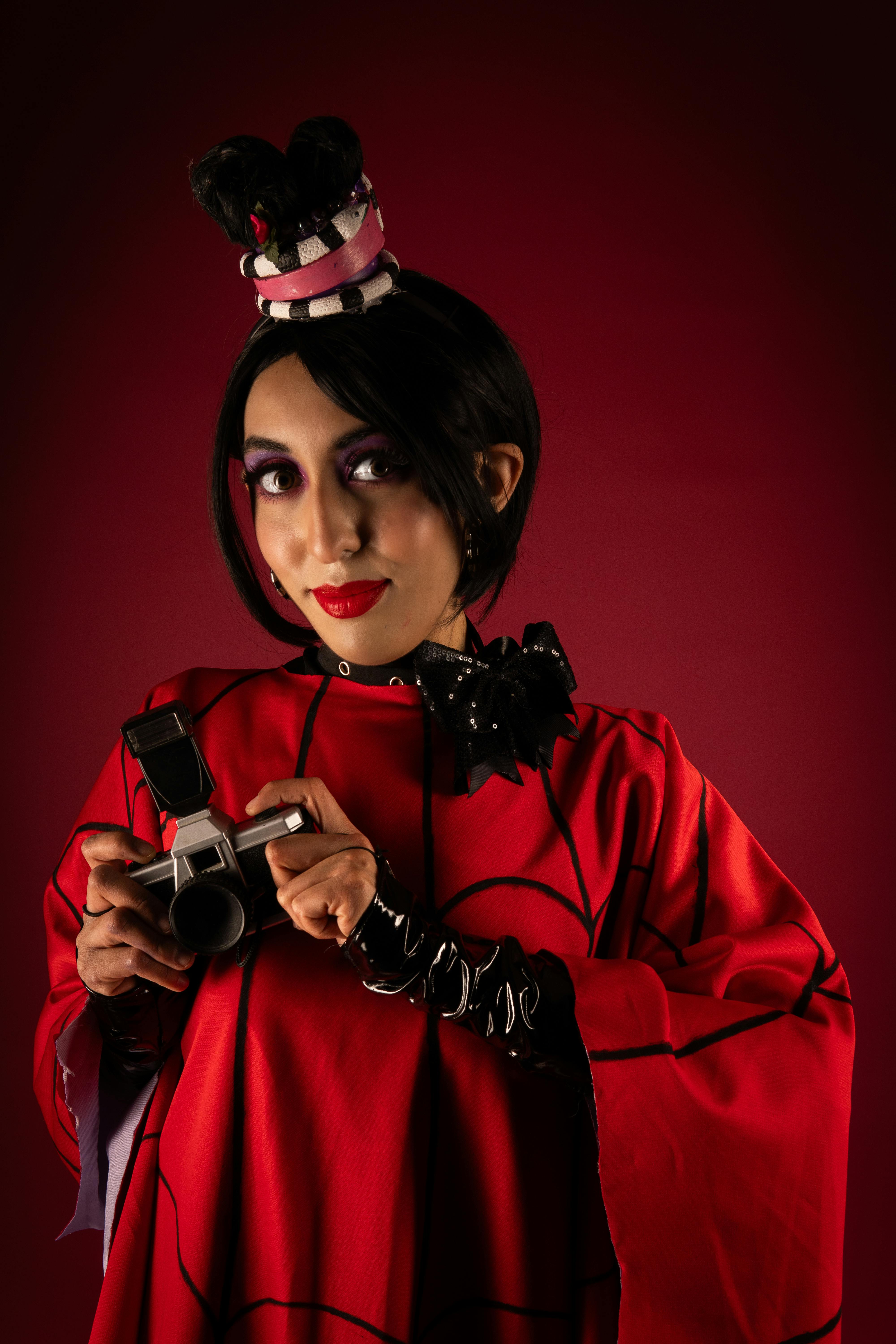 Creative Cosplay Portrait with Bold Red Costume · Free Stock Photo