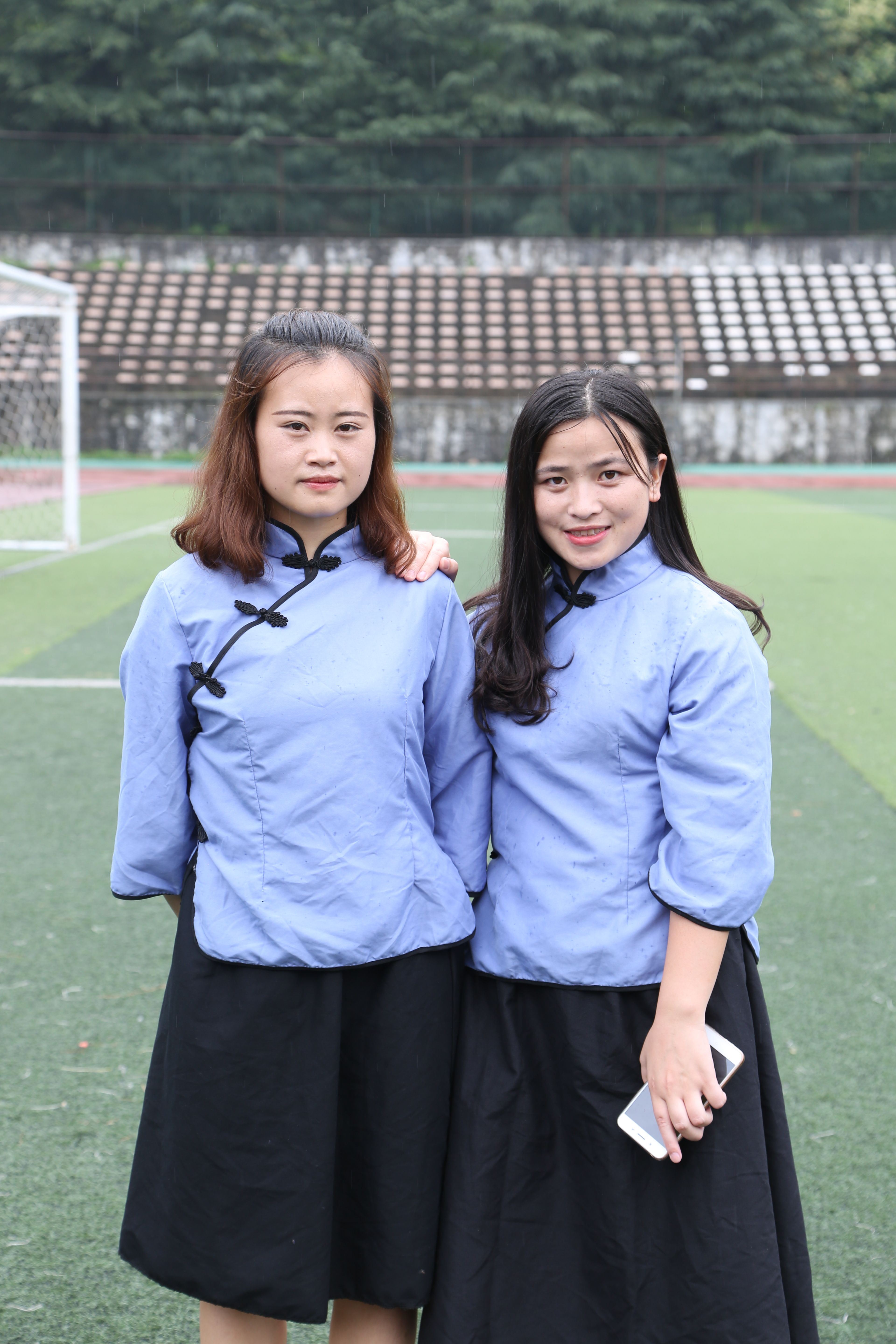 Women in Traditional Casual Attire on Sports Field · Free Stock Photo