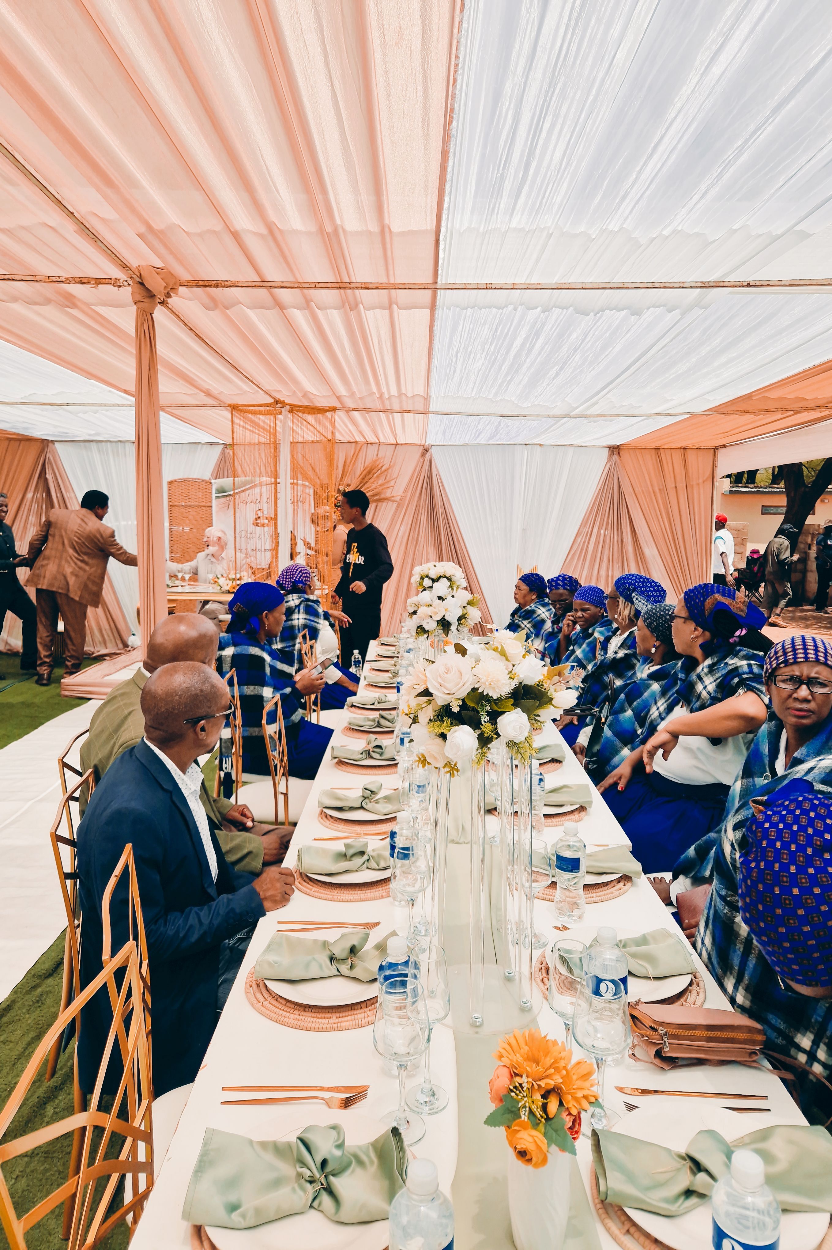 Elegant Outdoor Wedding Reception with Guests · Free Stock Photo