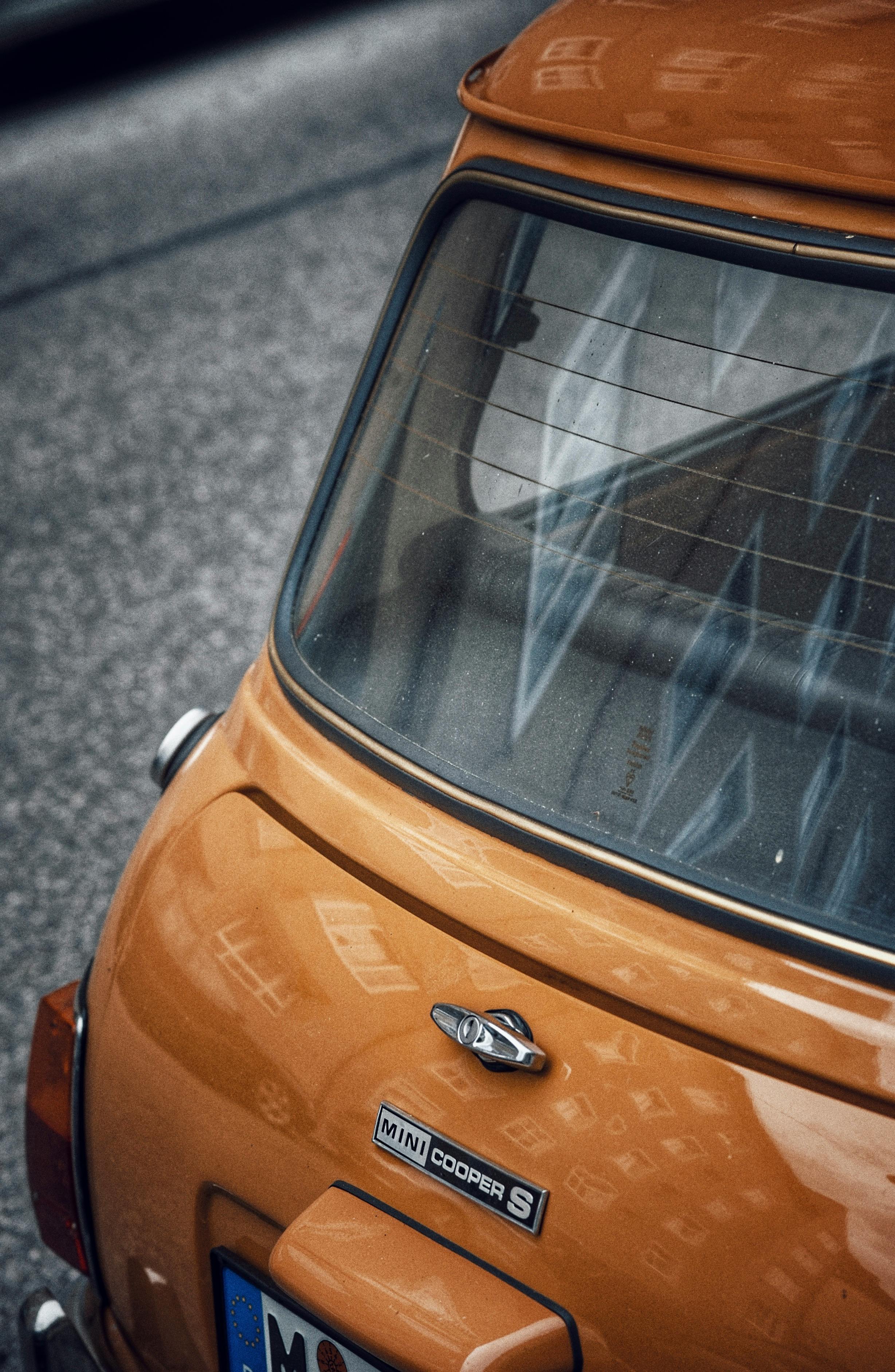 Classic Orange Mini Cooper in Munich Street · Free Stock Photo