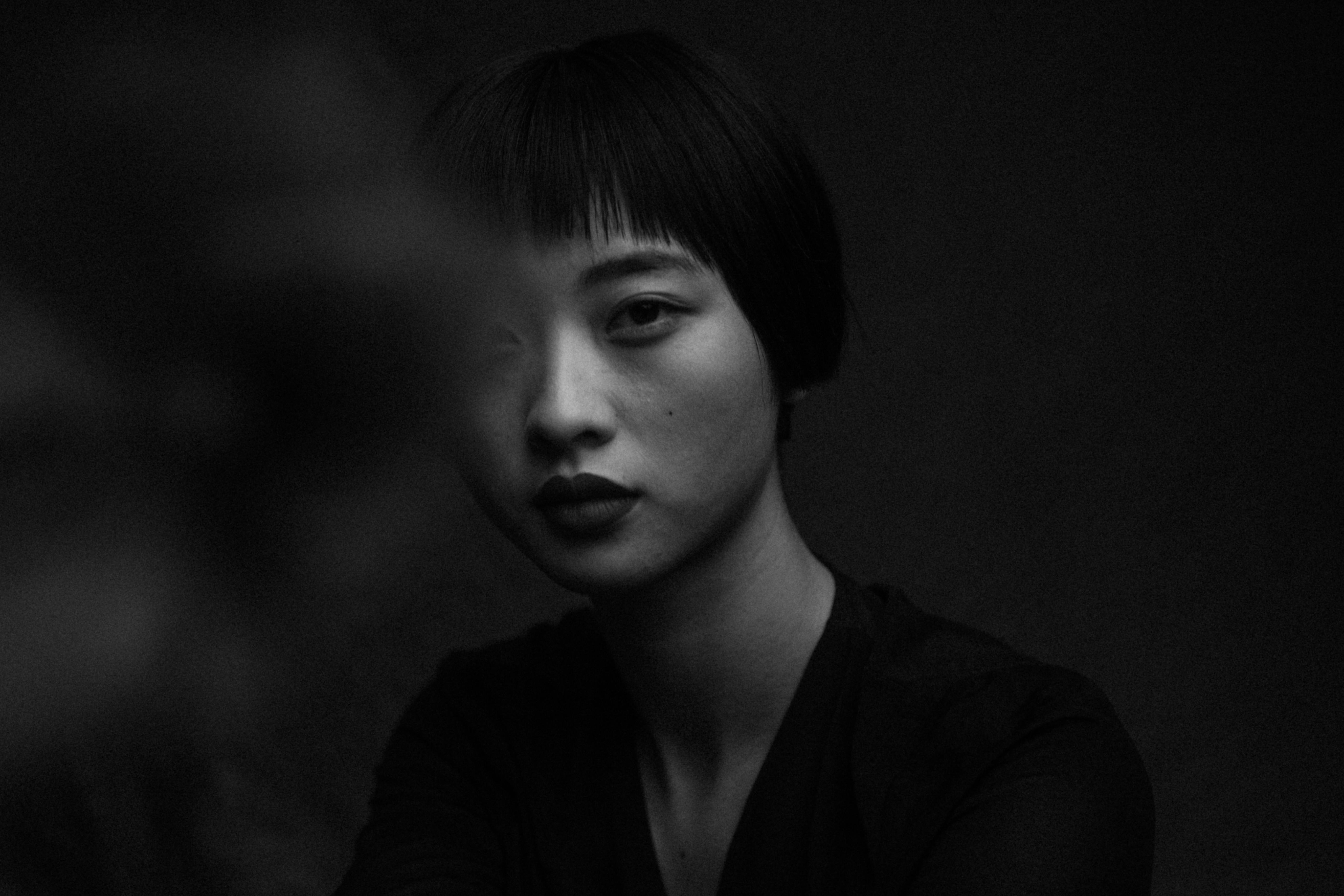 Moody Black and White Portrait of Woman · Free Stock Photo