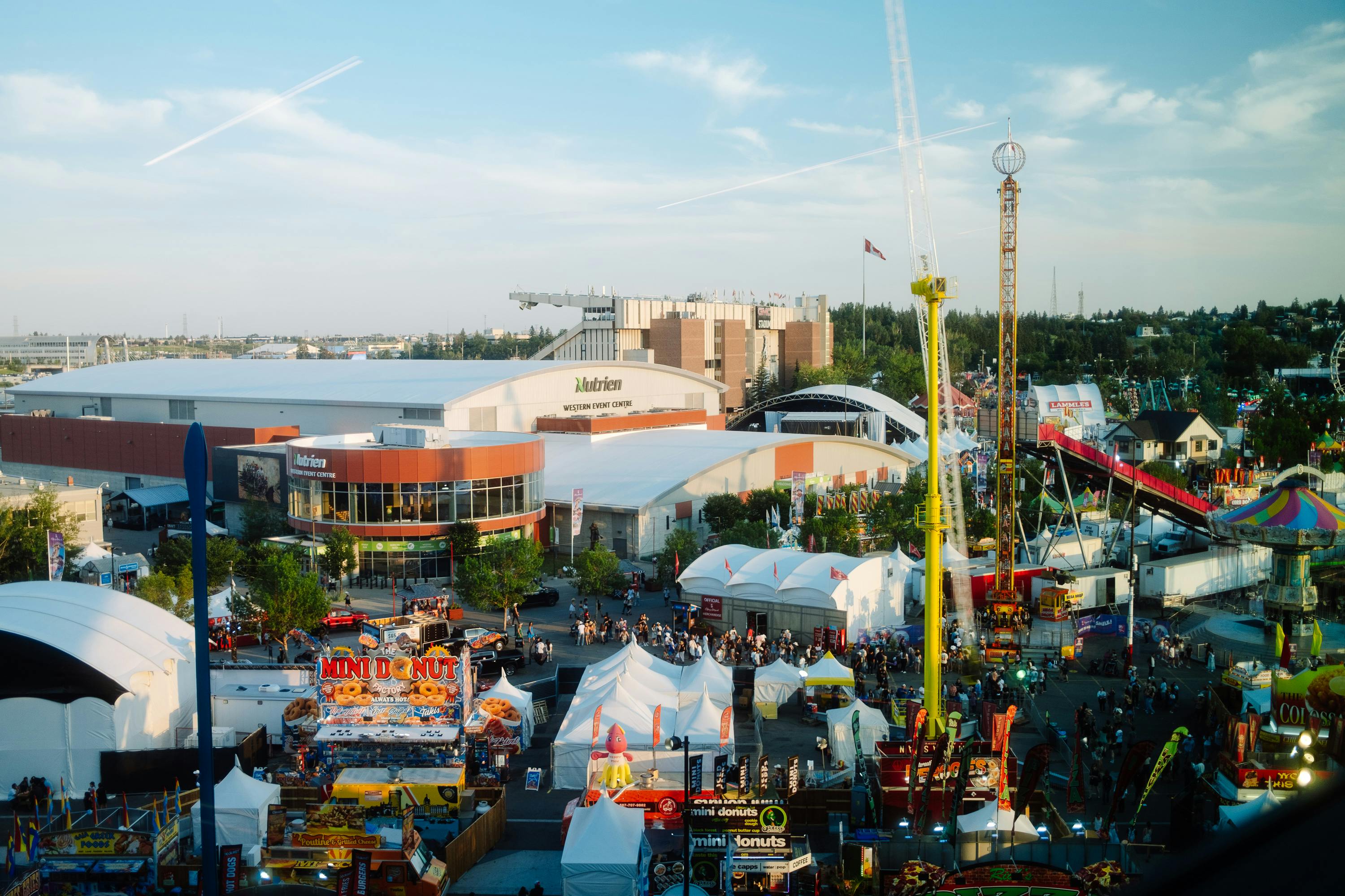 Aerial View of Lively Fairground at Sunset · Free Stock Photo