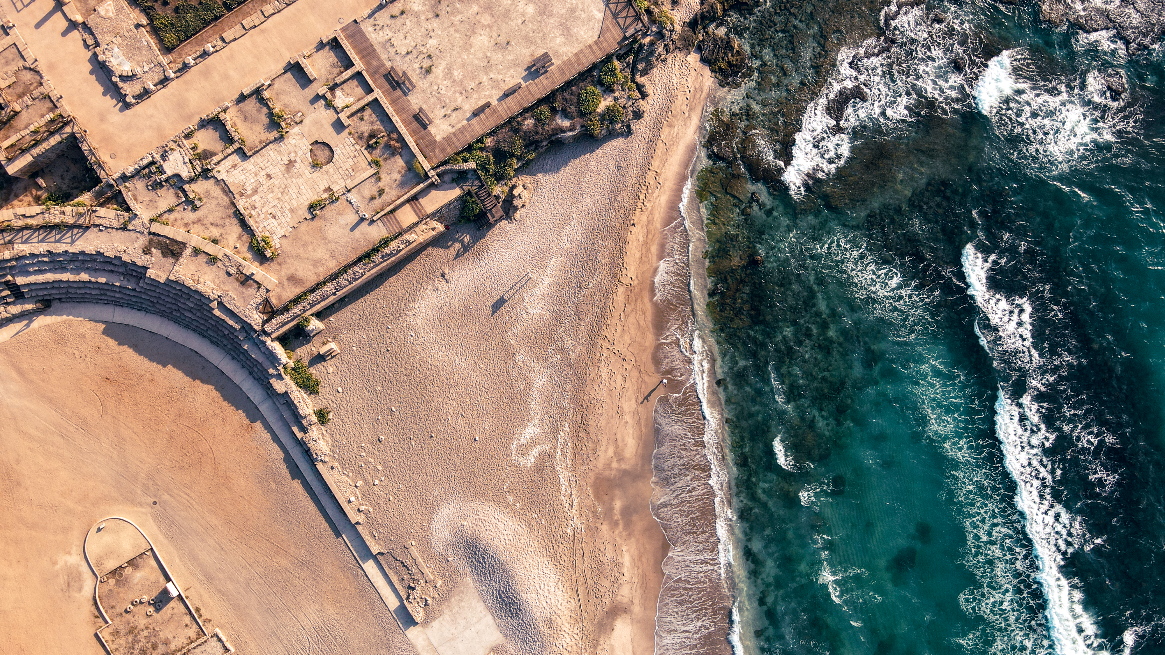 Aerial View of Ancient Caesarea Roman Ruins and Beach · Free Stock Photo