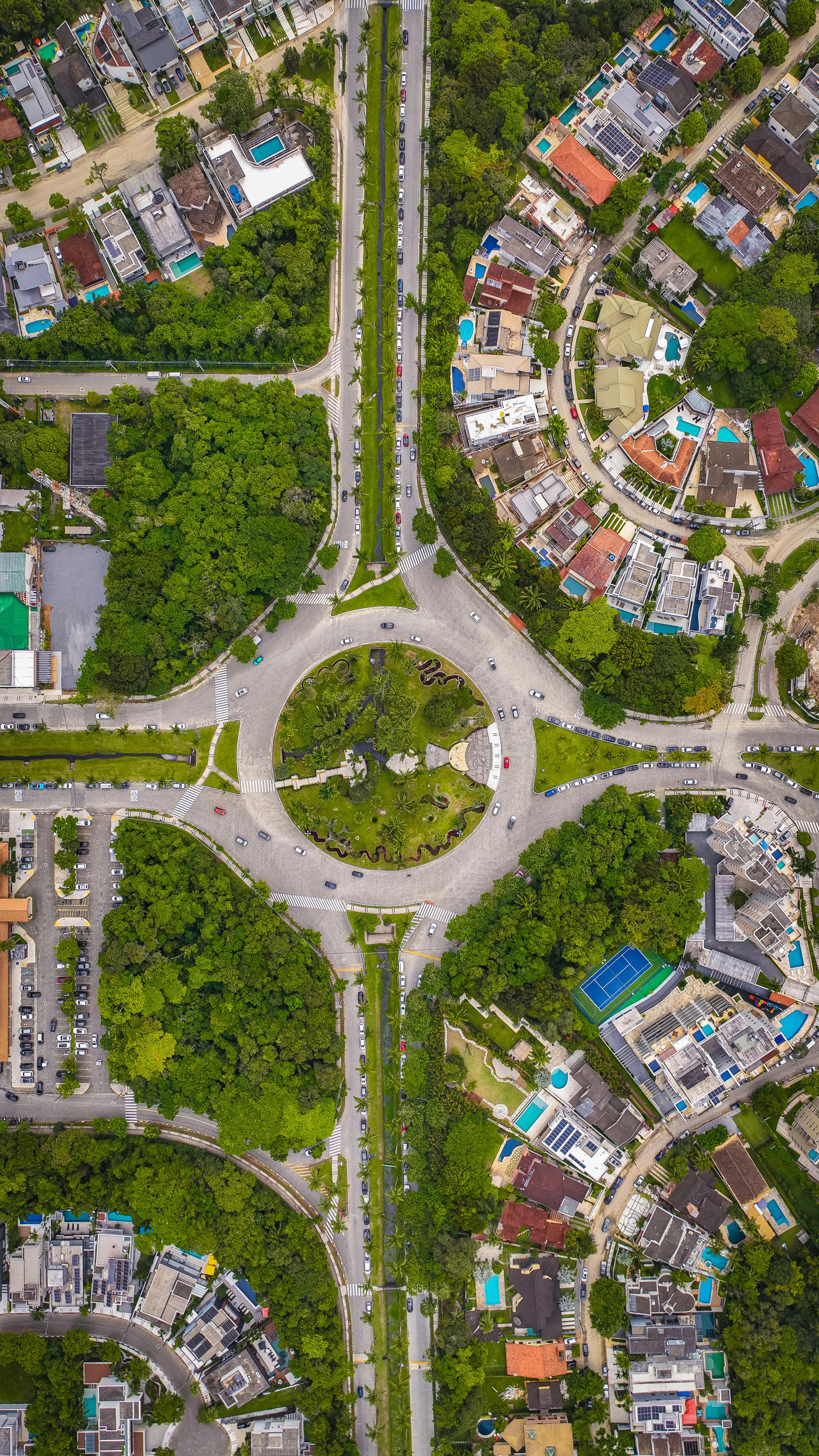 Aerial View of a Vibrant Urban Roundabout · Free Stock Photo