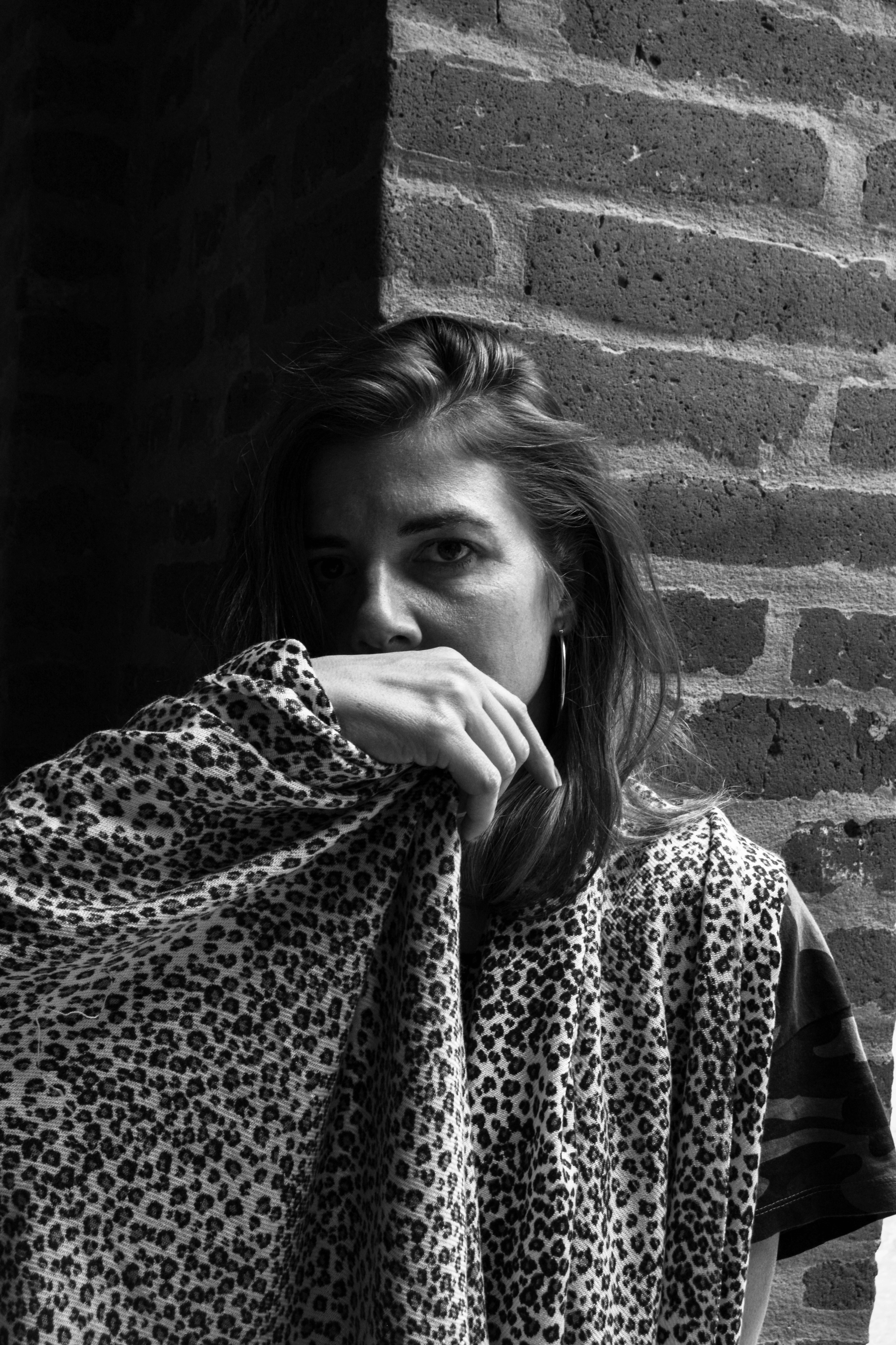 Black and White Portrait of a Woman with Leopard Print · Free Stock Photo
