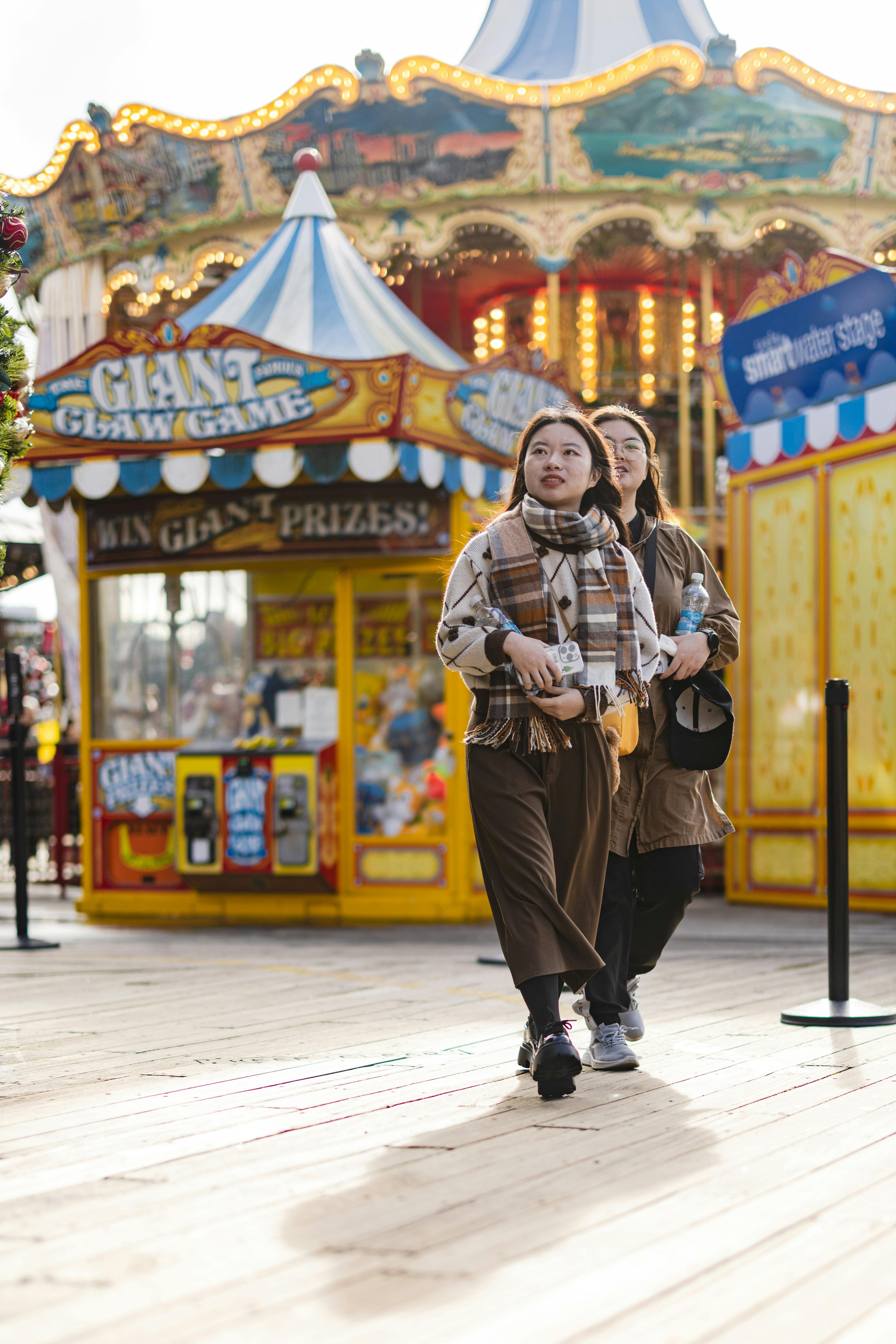 Women Enjoying a Festive Carnival Day Out · Free Stock Photo