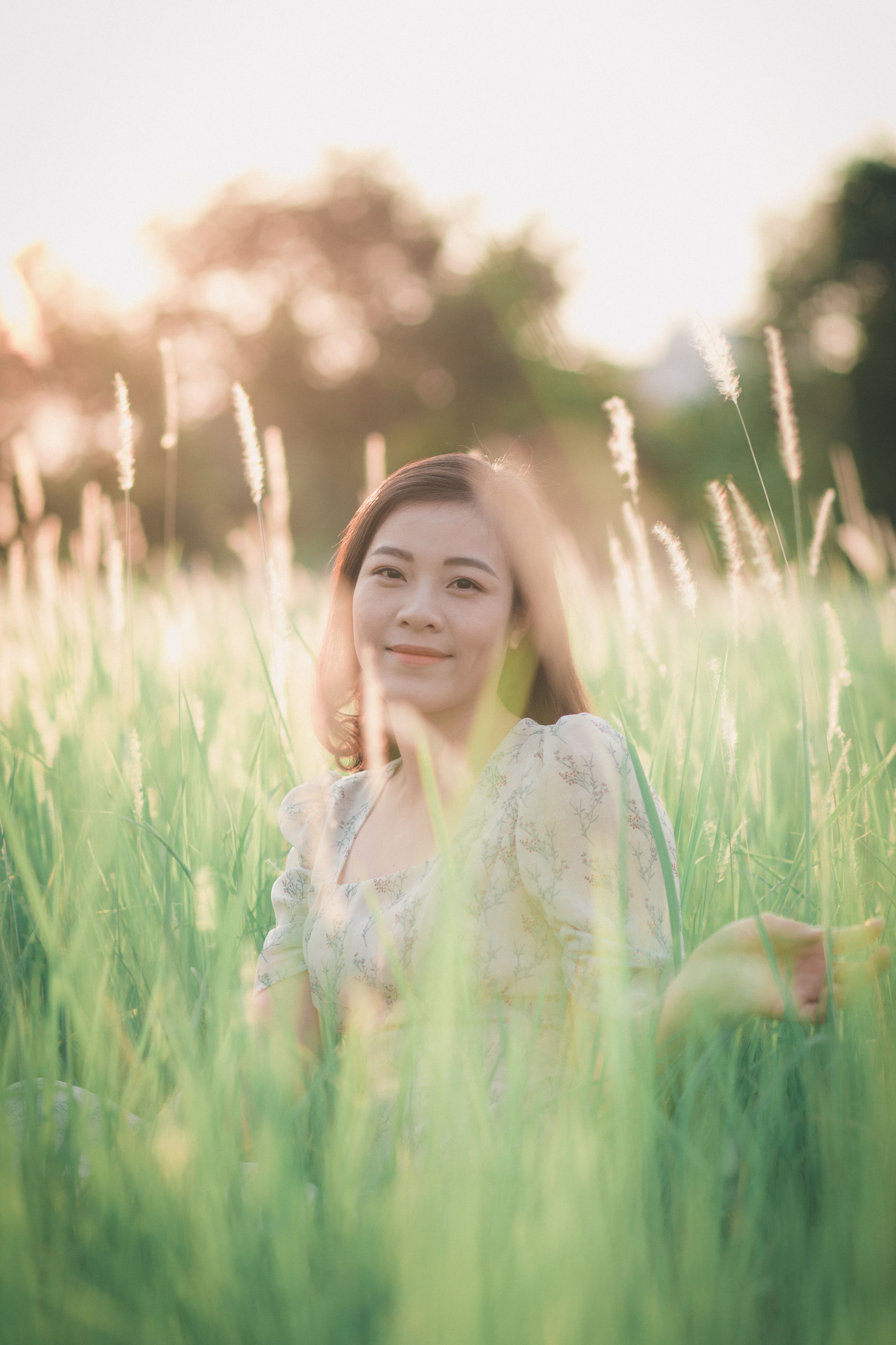 Woman Standing On Grass Field · Free Stock Photo