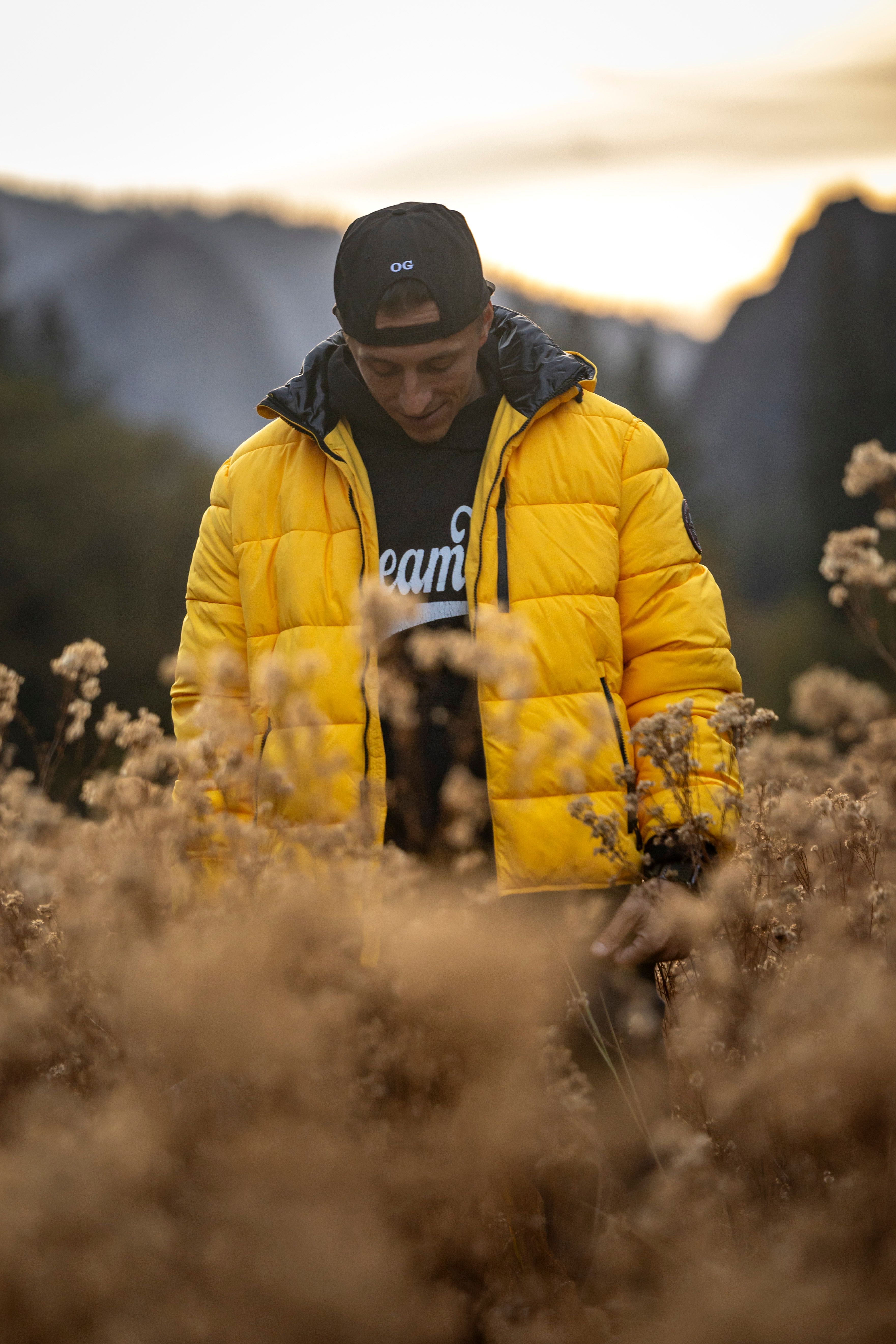 Man in Yellow Jacket in Autumn Landscape · Free Stock Photo