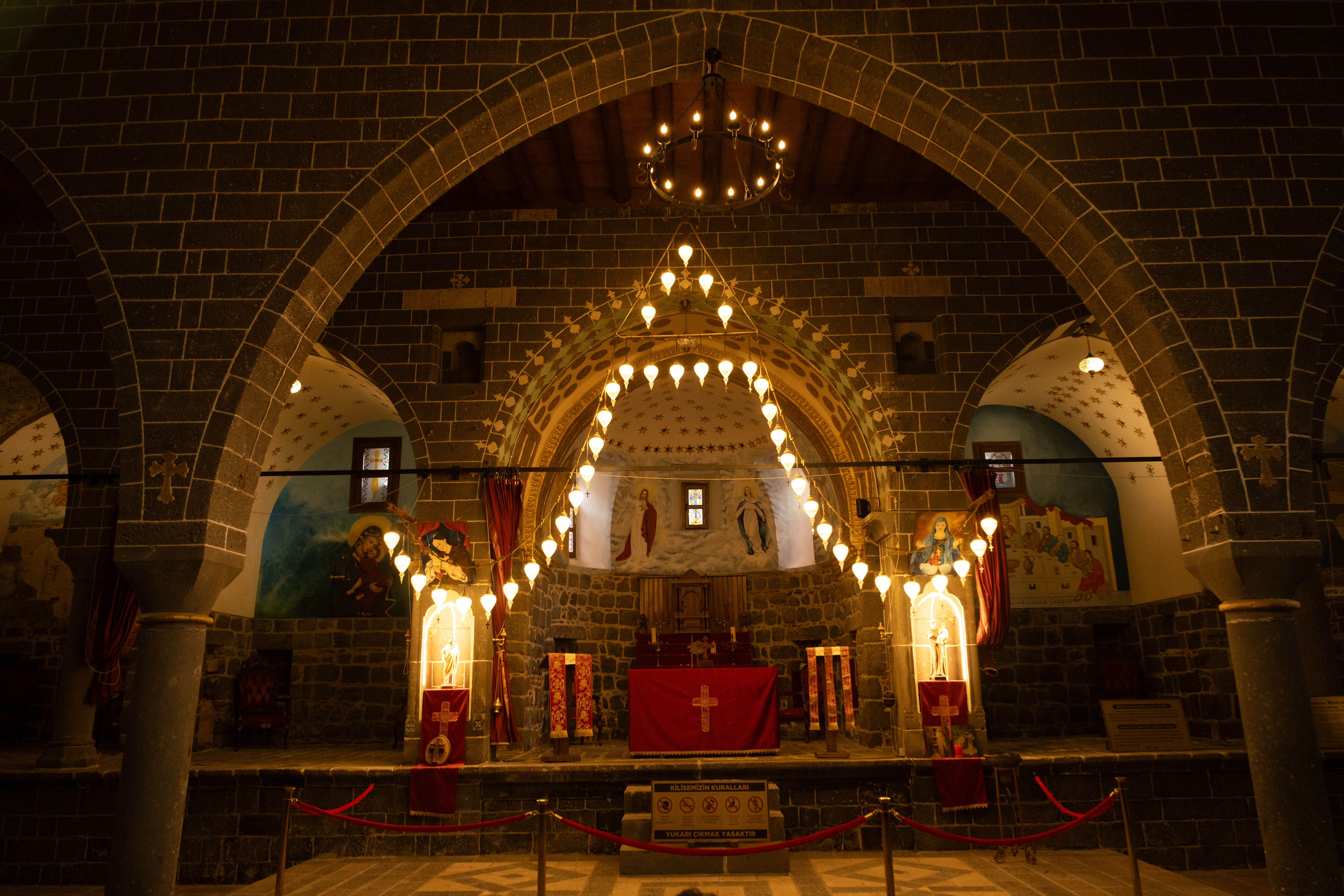 Historic Church Interior with Illuminated Altar · Free Stock Photo
