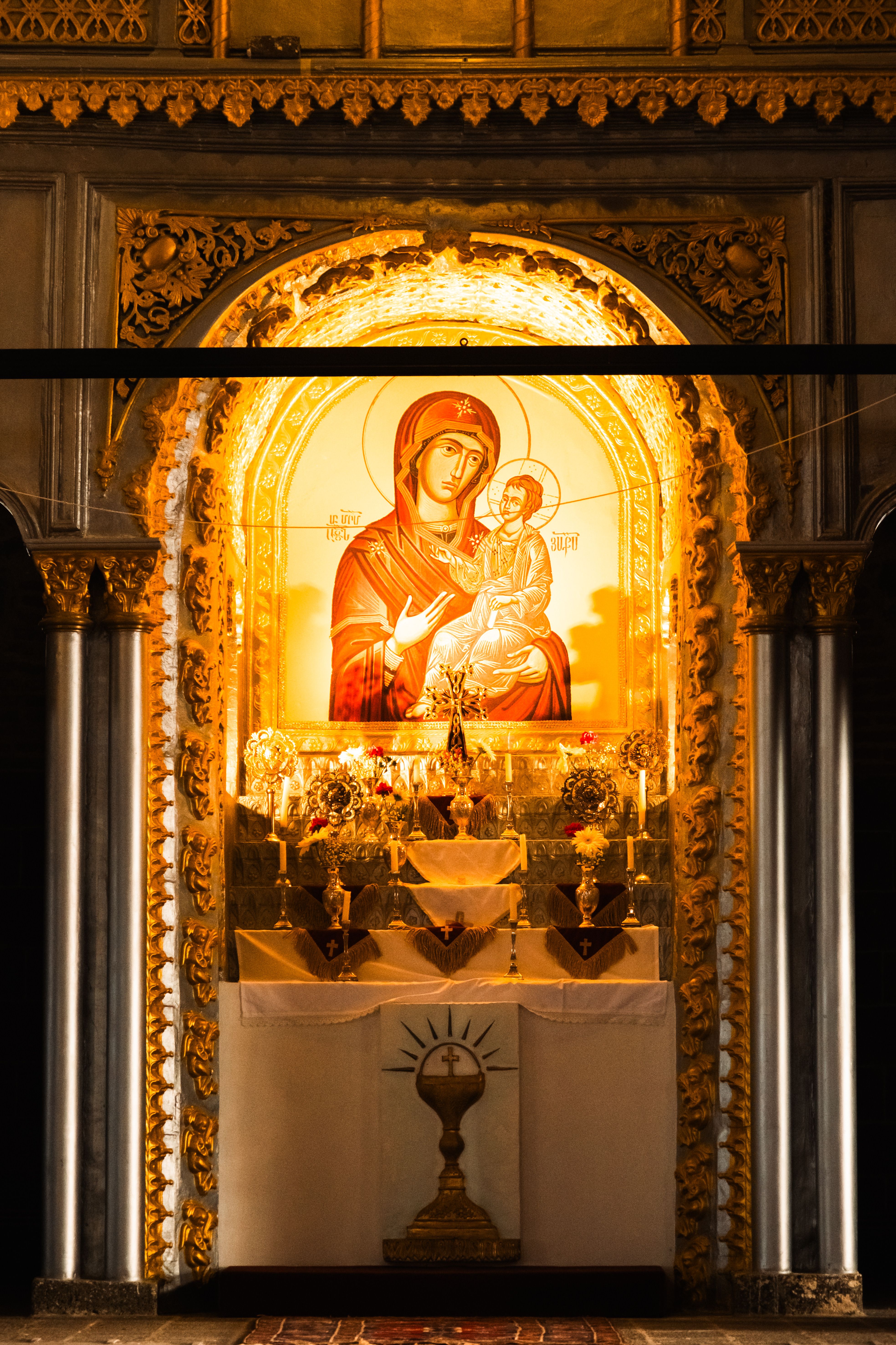 Illuminated Religious Icon in Ornate Setting · Free Stock Photo
