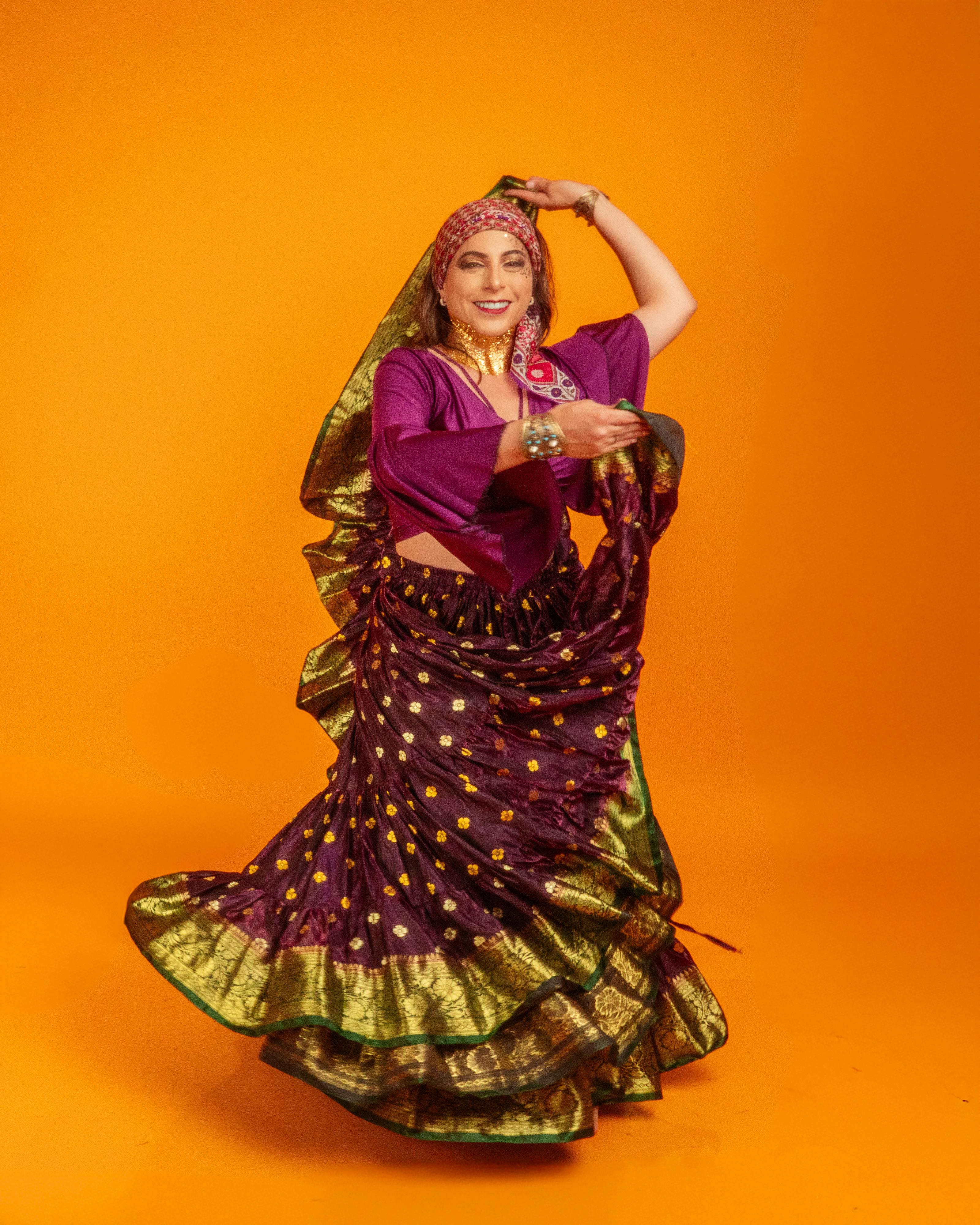 Elegant Romani Dancer in Vibrant Costume · Free Stock Photo