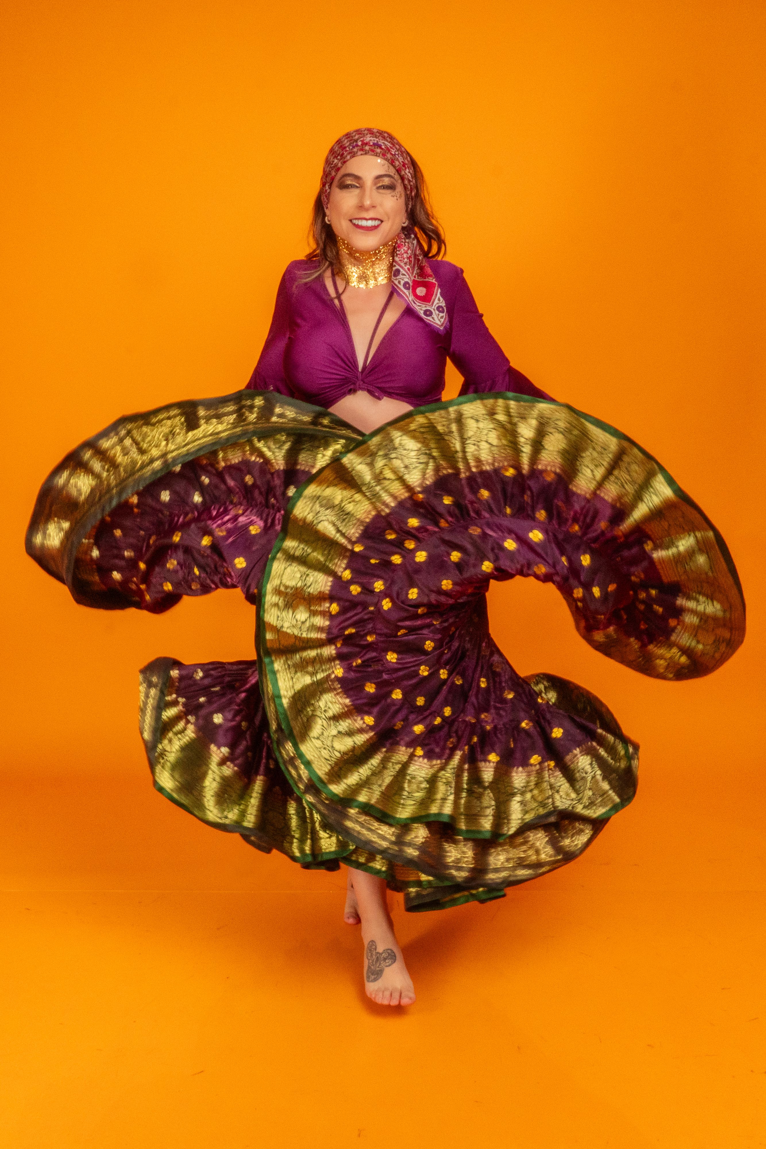 Vibrant Romani Dance Costume in Motion · Free Stock Photo