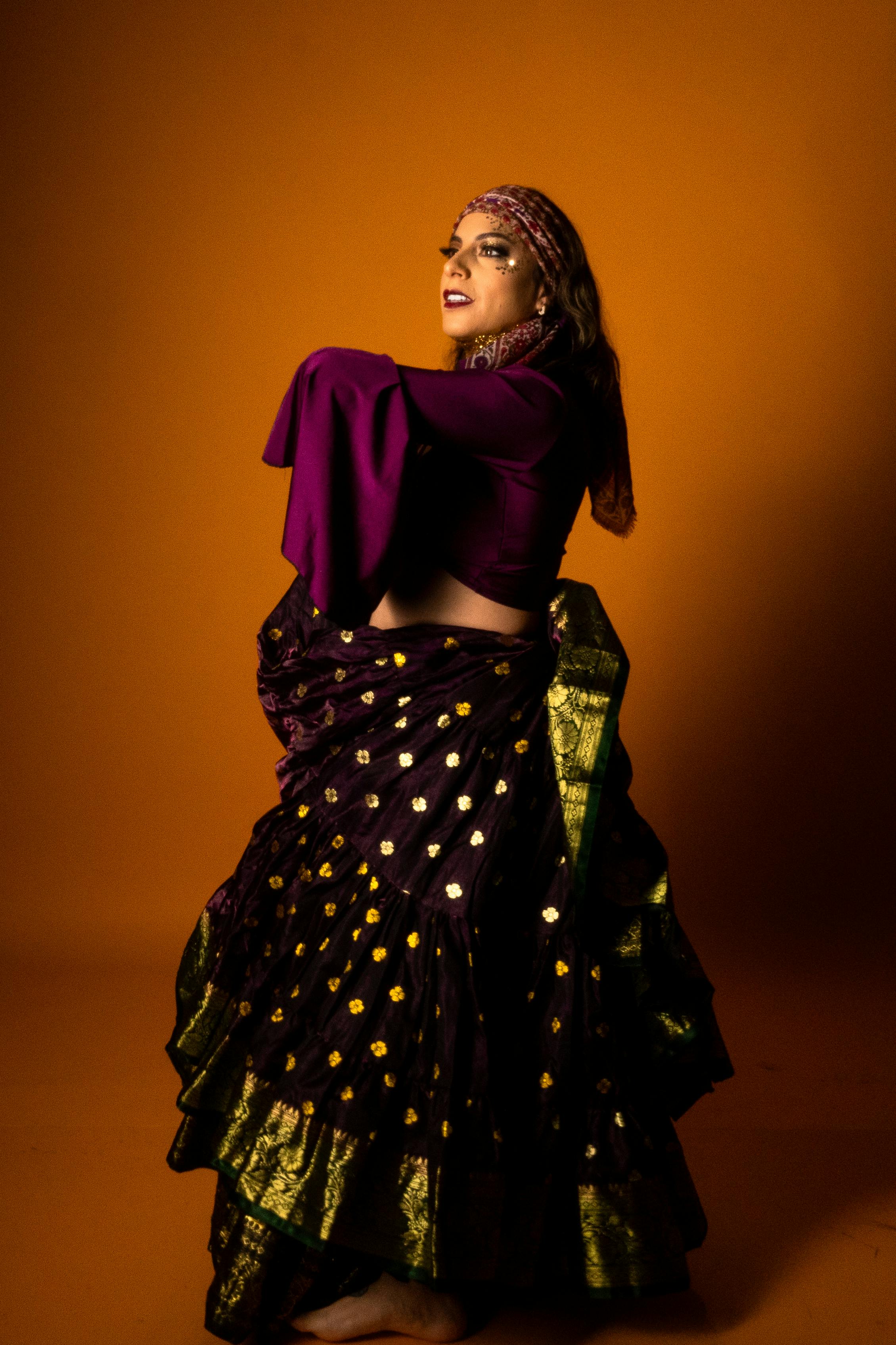 Elegant Romani Female Dancer in Traditional Attire · Free Stock Photo