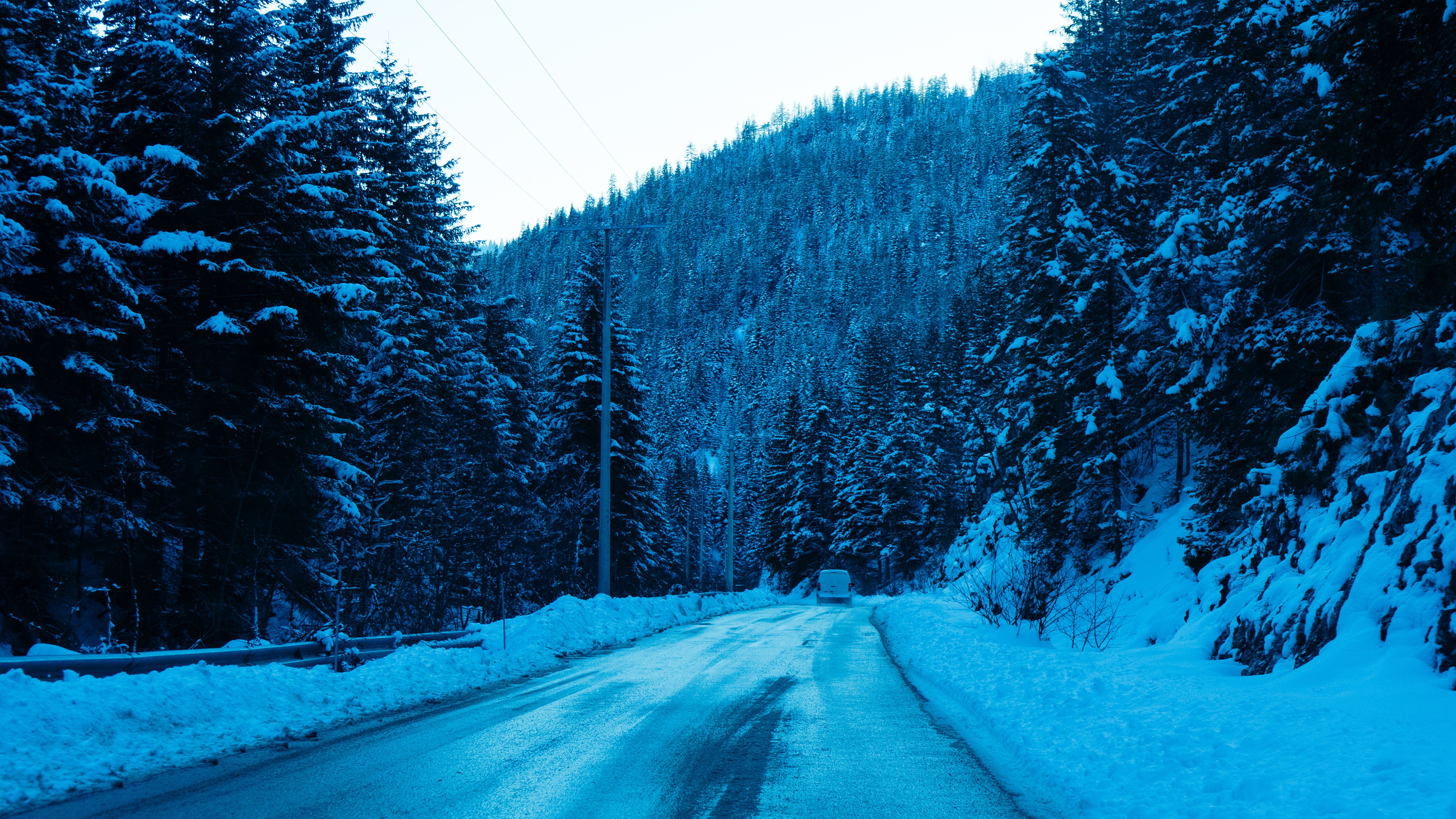 Snow-Covered Mountain Road in Winter Wonderland · Free Stock Photo