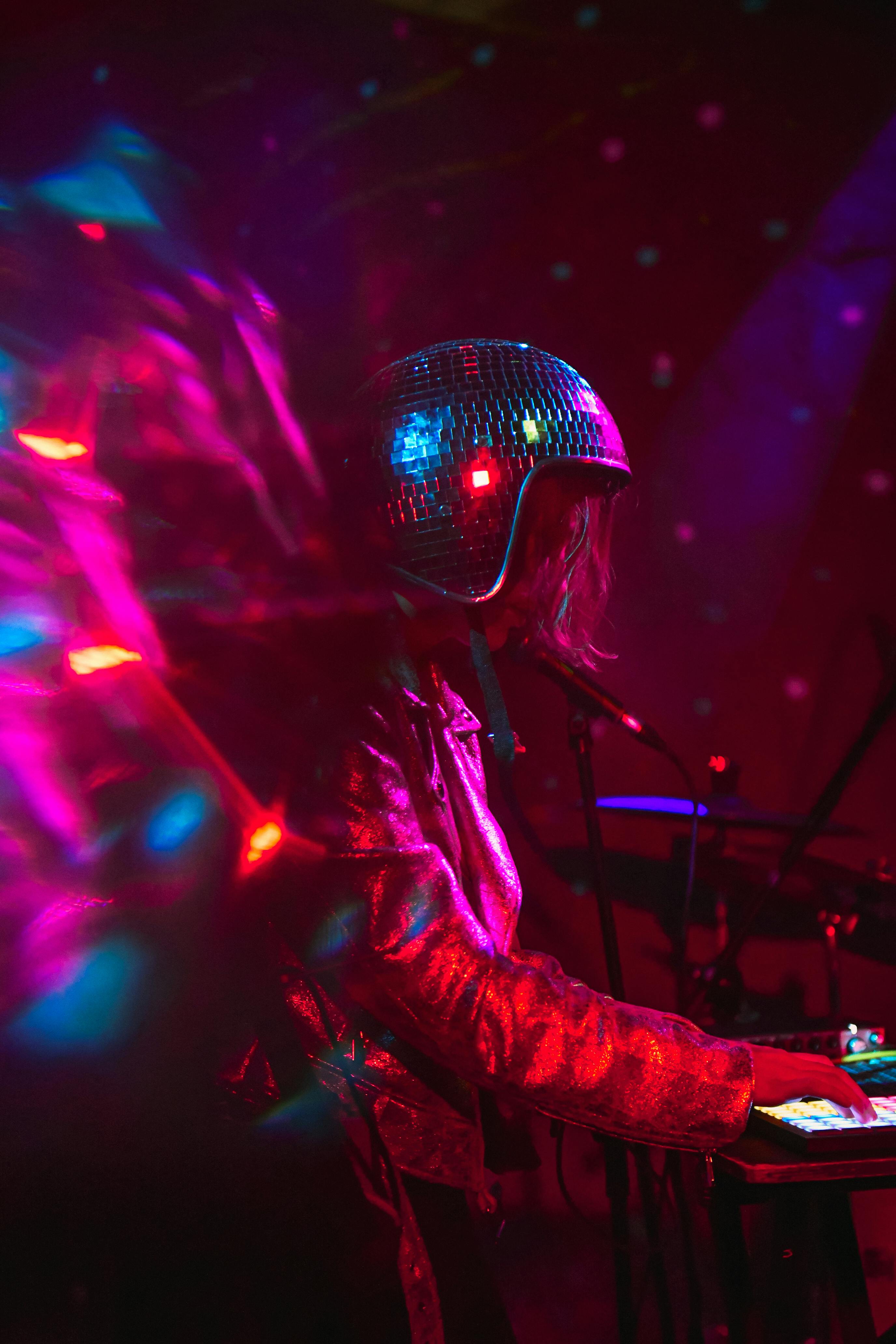 Colorful Night Performance with Disco Helmet · Free Stock Photo