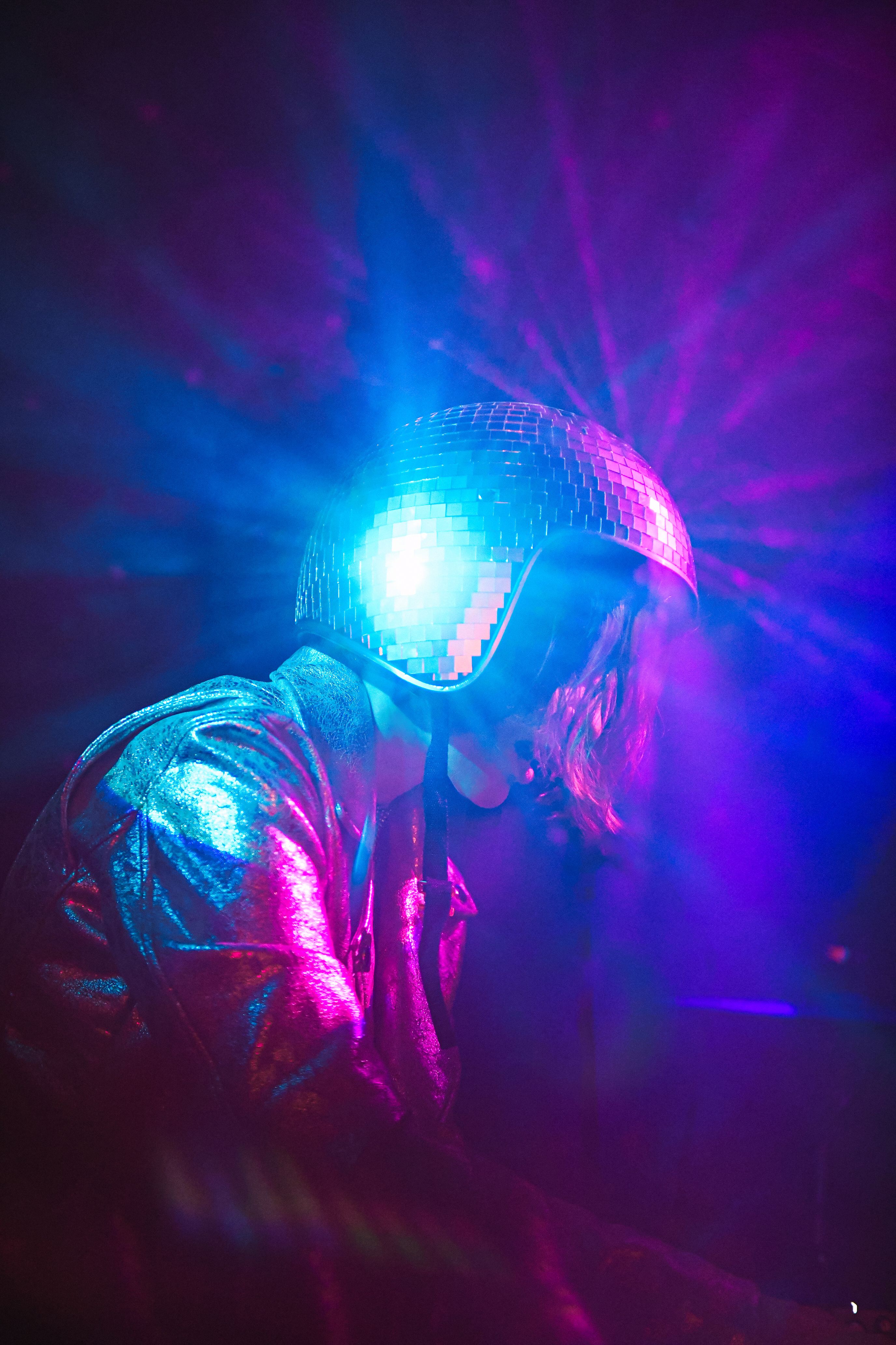 Vibrant Disco-Themed DJ in Metallic Helmet · Free Stock Photo