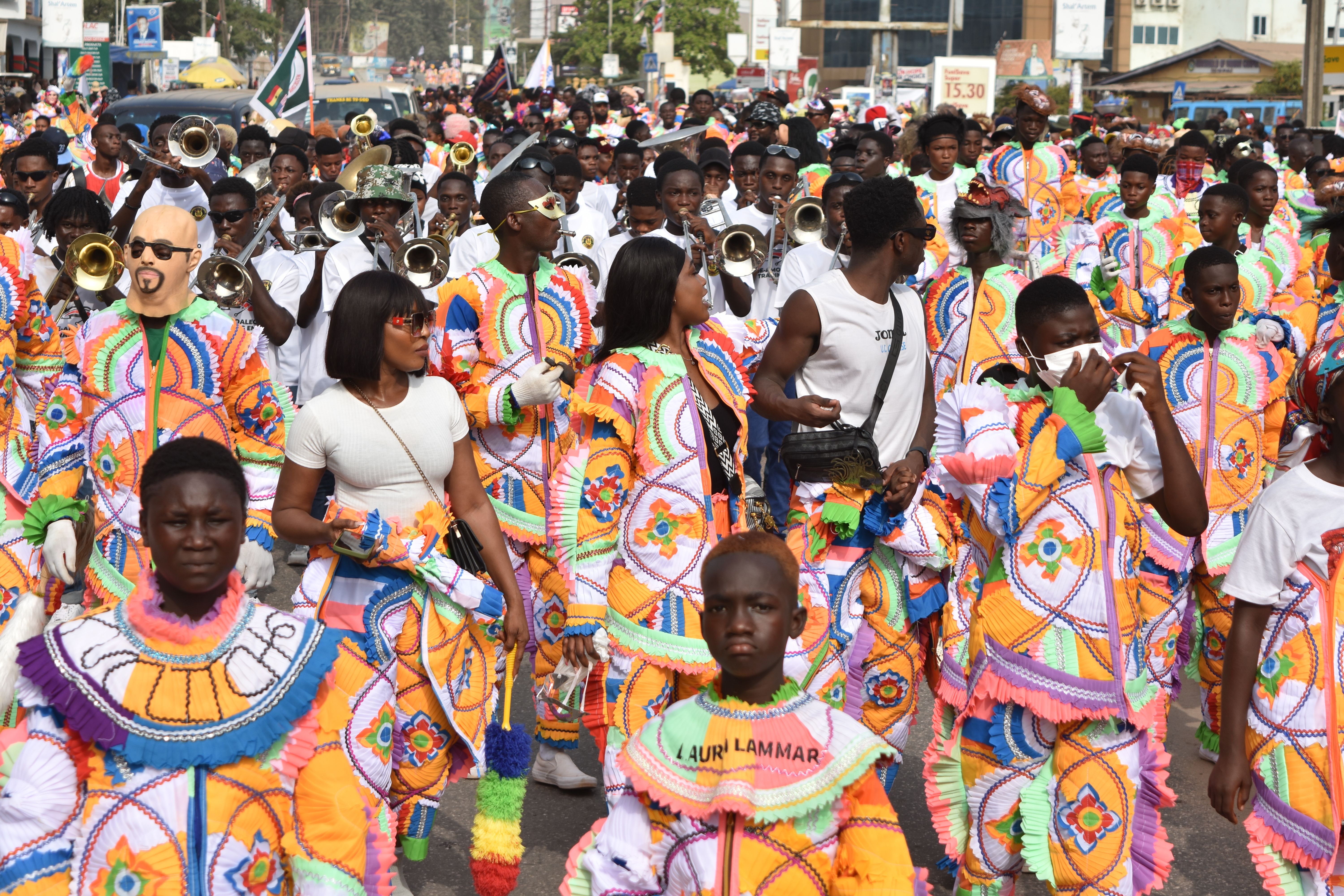 Vibrant Street Parade with Colorful Costumes · Free Stock Photo