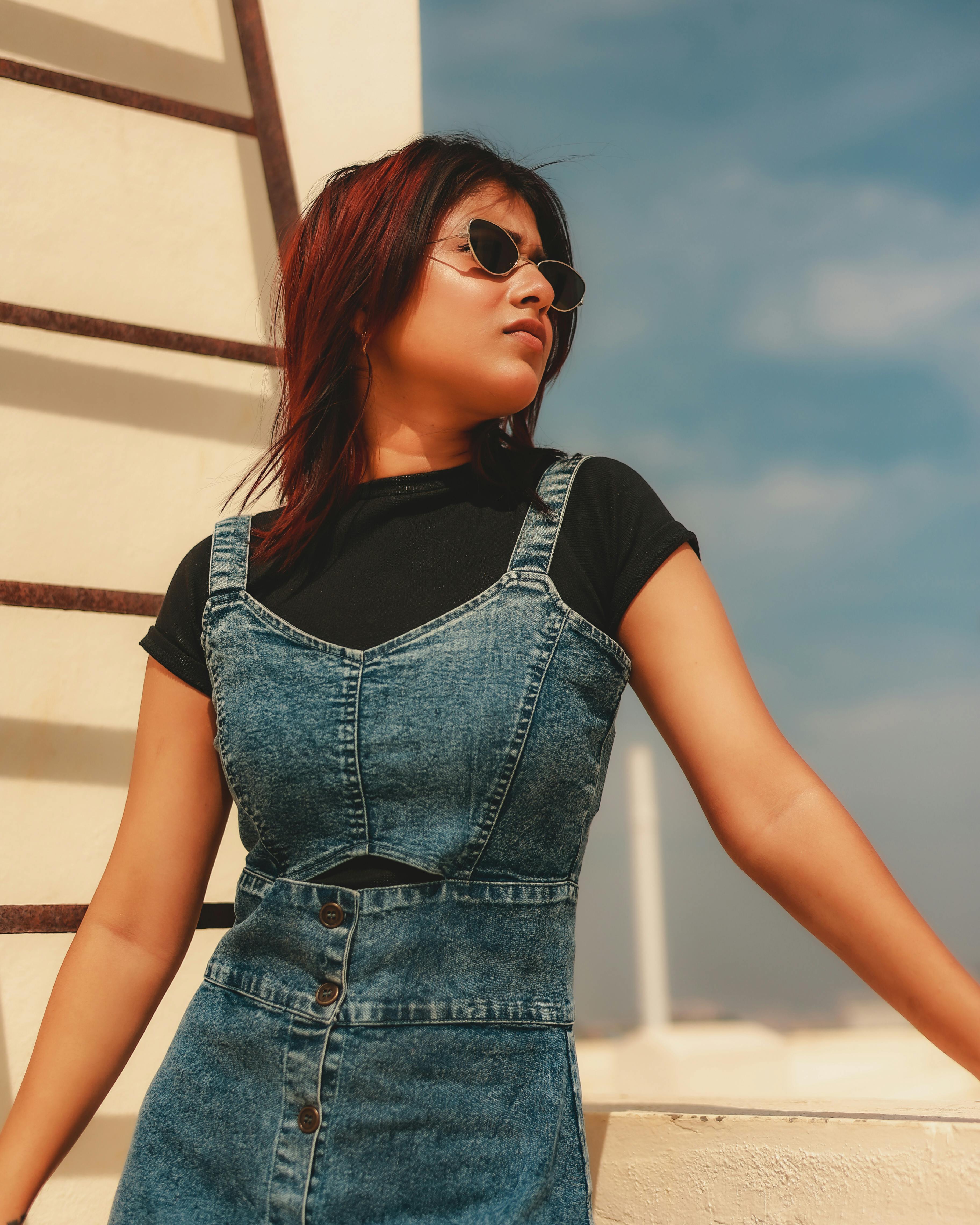 Chic Portrait of a Young Woman in Denim Dress · Free Stock Photo