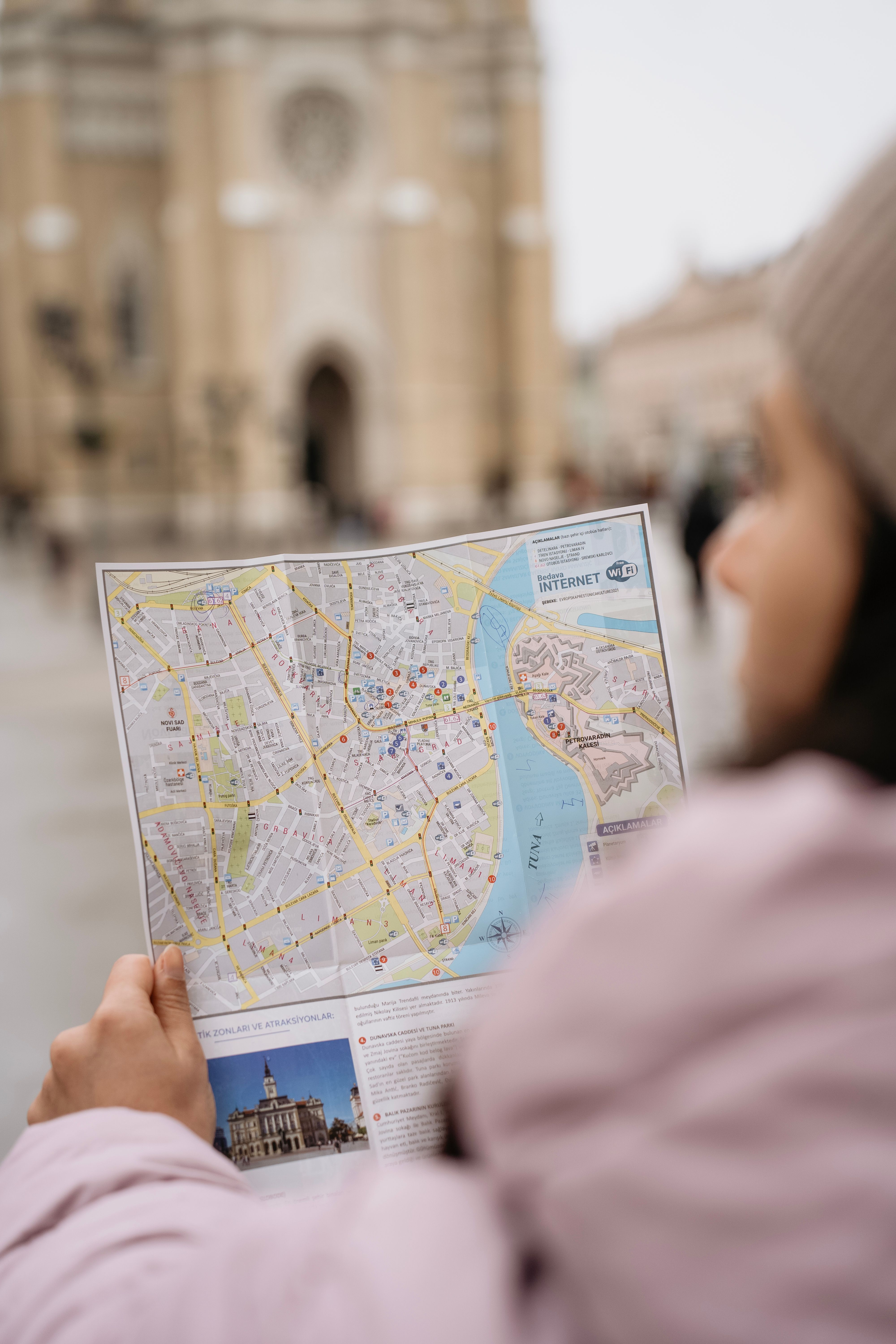 Tourist with Map in Novi Sad City Center · Free Stock Photo