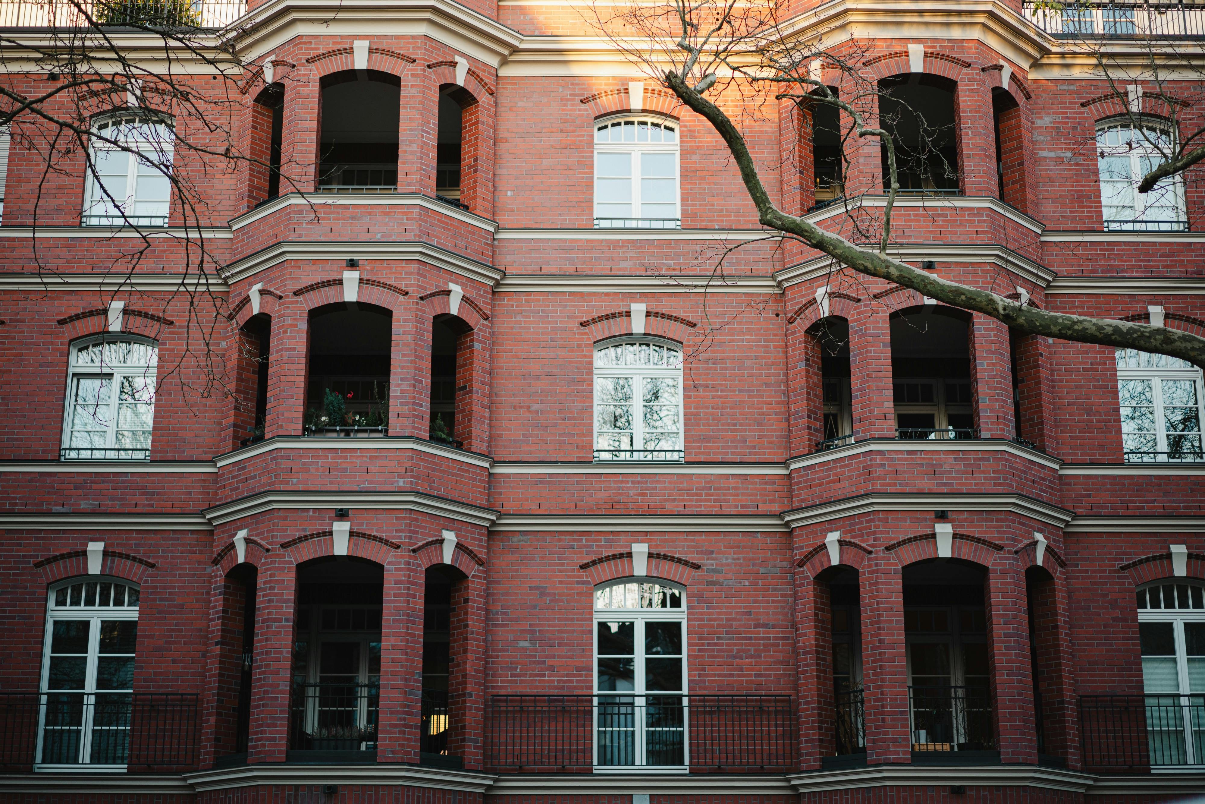 Charming European Style Red Brick Building Facade · Free Stock Photo