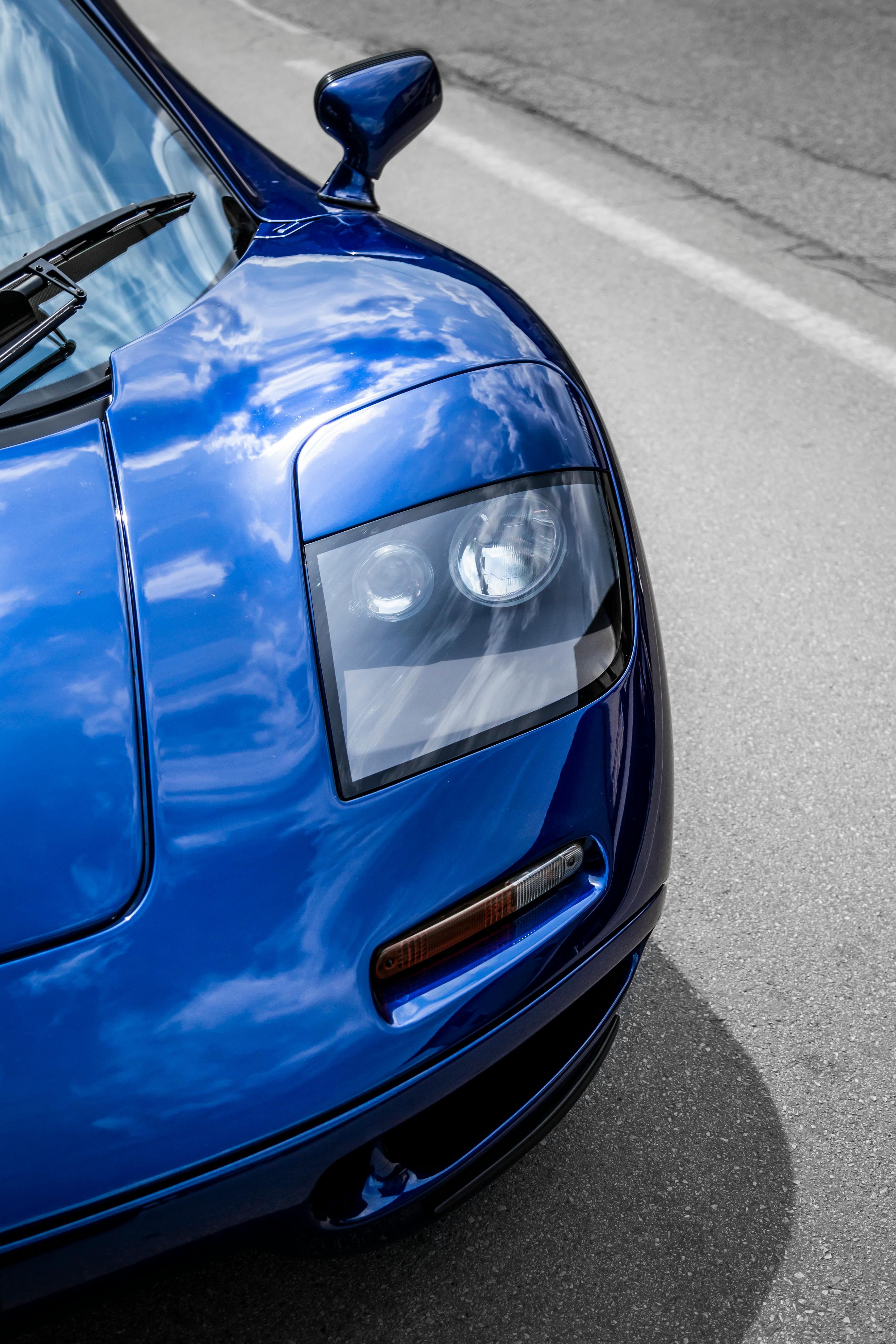 Close-Up of a Blue Supercar Headlight · Free Stock Photo