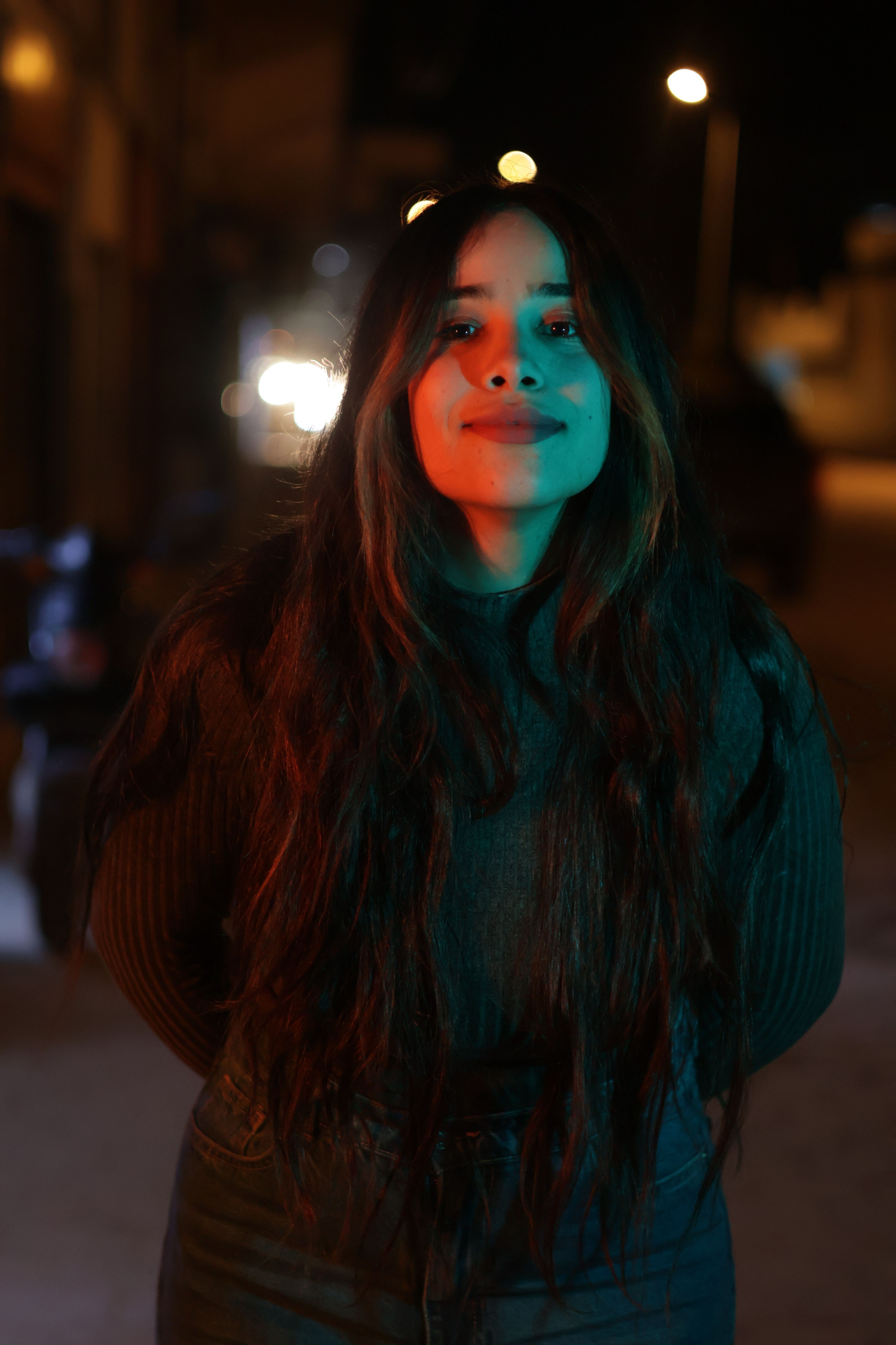 Young Woman in Dramatic Night Street Lighting · Free Stock Photo