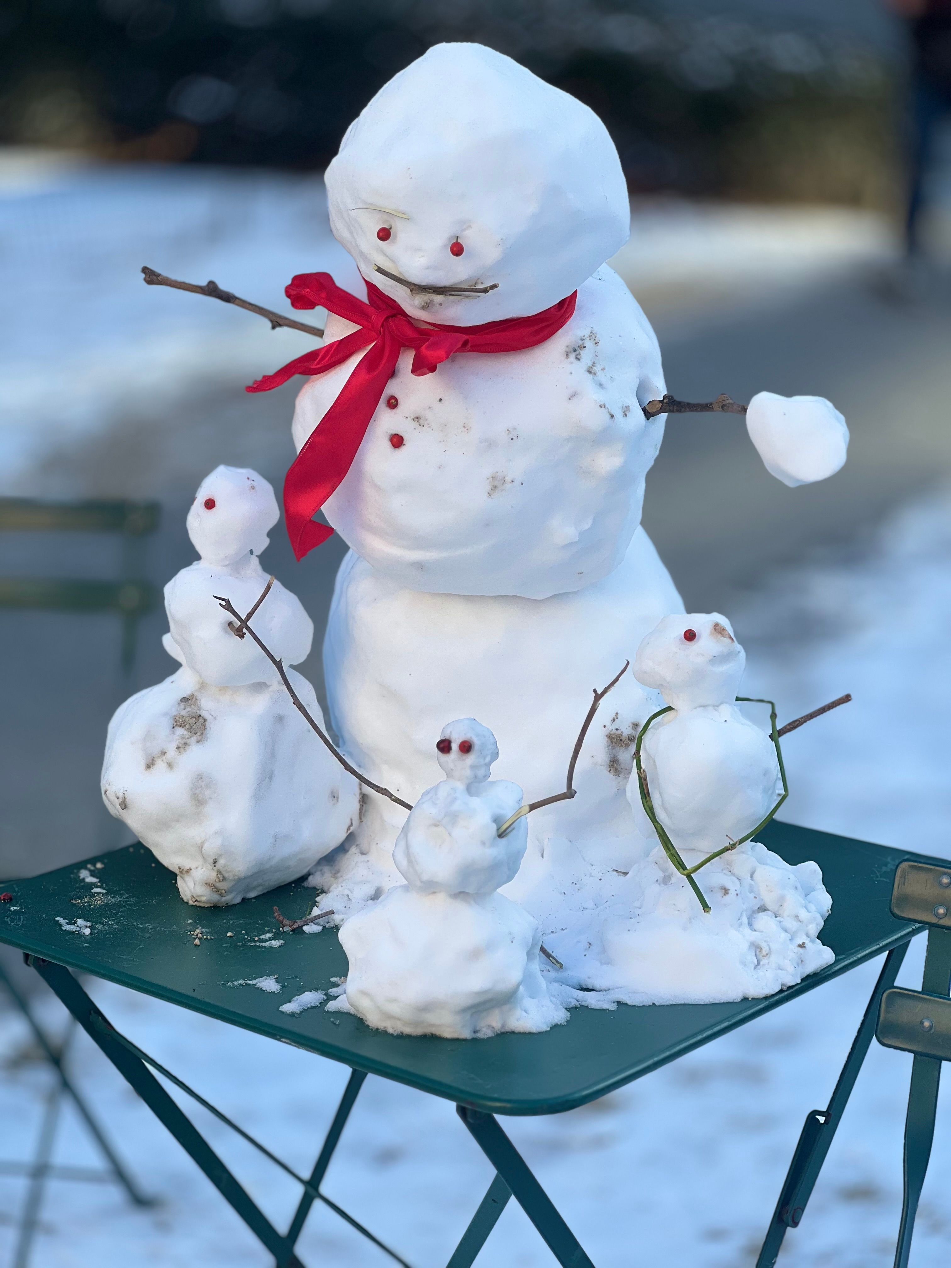 Charming Family of Snowmen on a Winter Day · Free Stock Photo