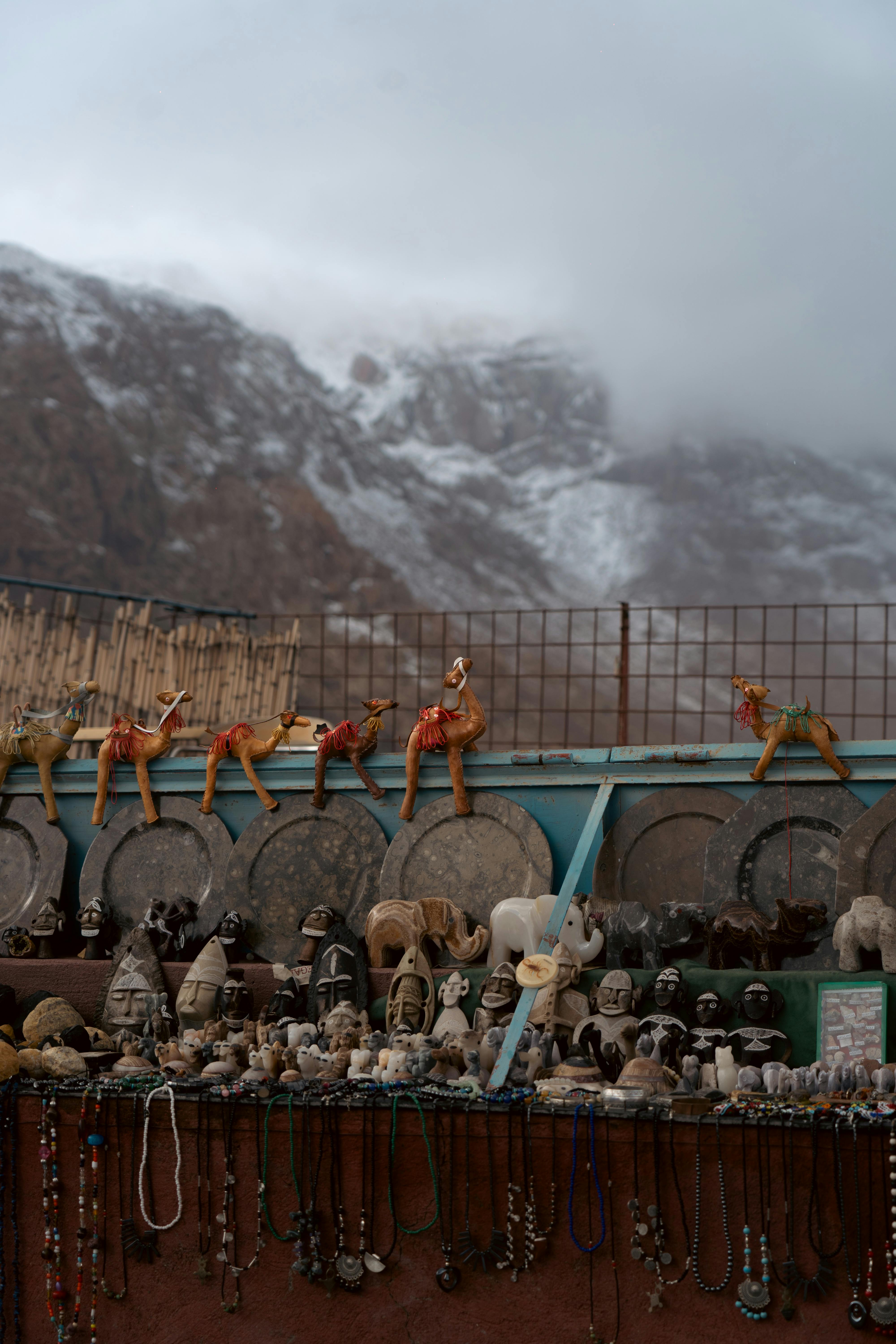 Rustic Market Stalls with Mountain View · Free Stock Photo