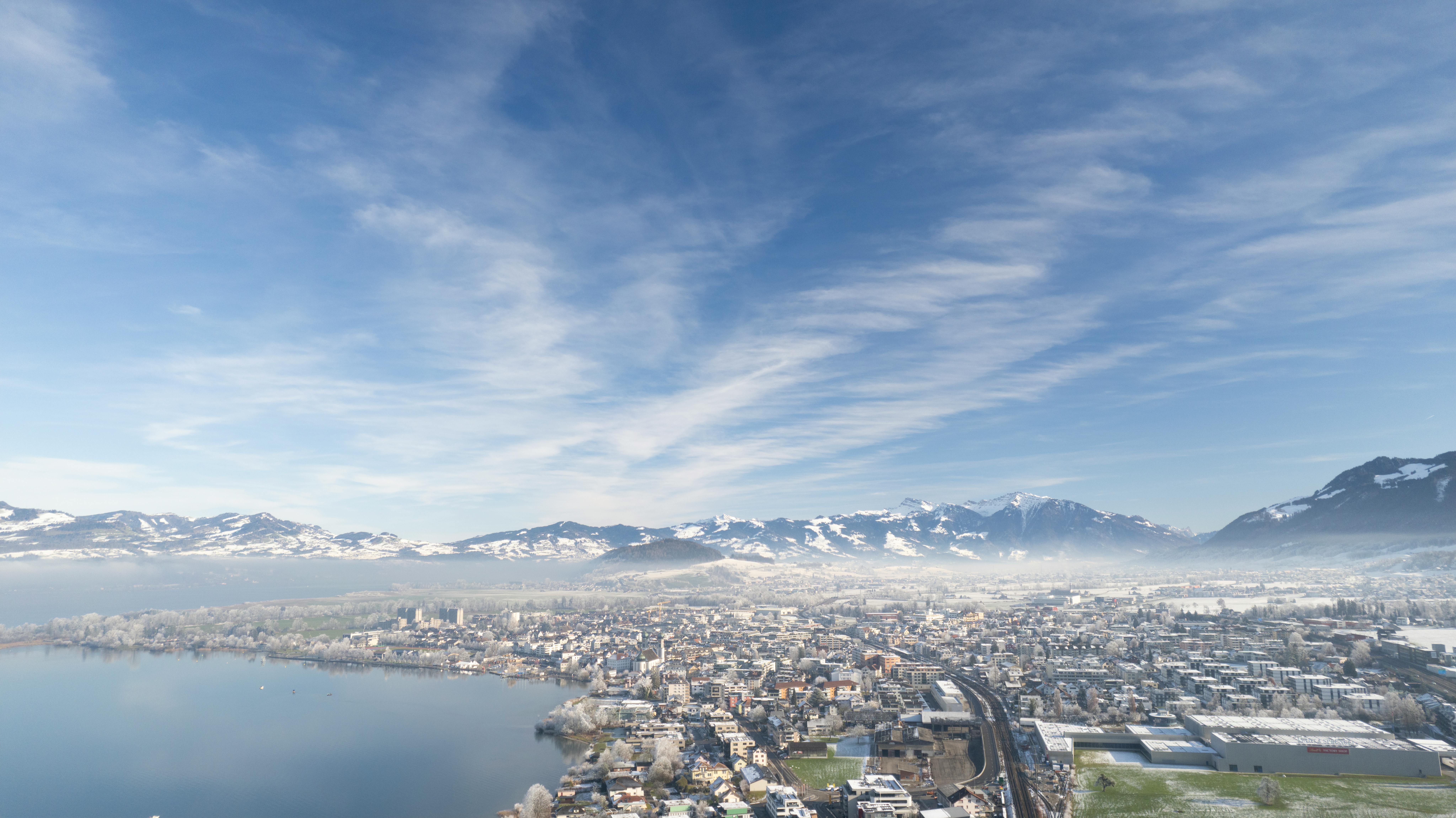 Aerial View of Altendorf with Swiss Alps in Winter · Free Stock Photo