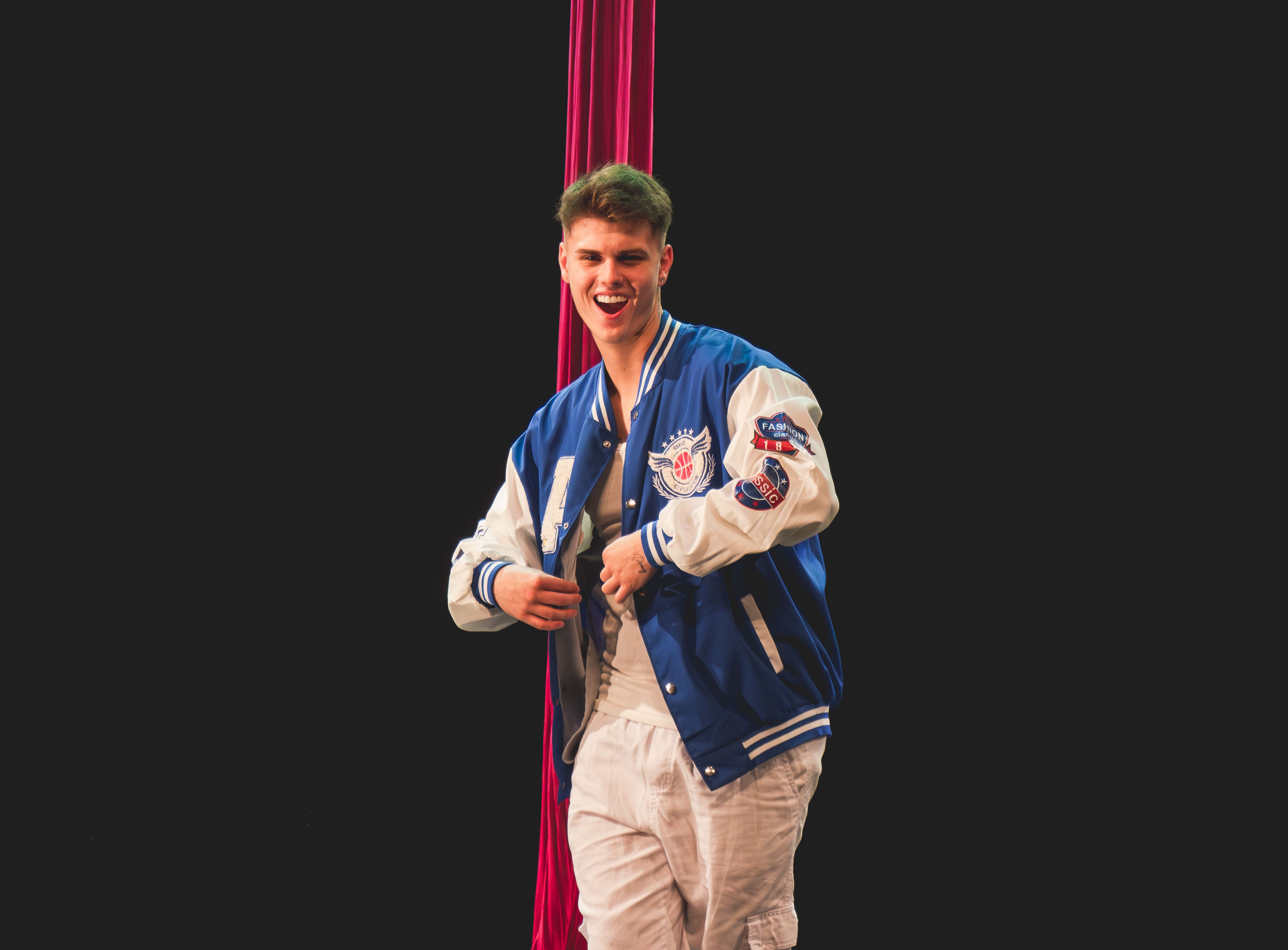 Teenager in Blue Jacket Performing Aerial Dance · Free Stock Photo
