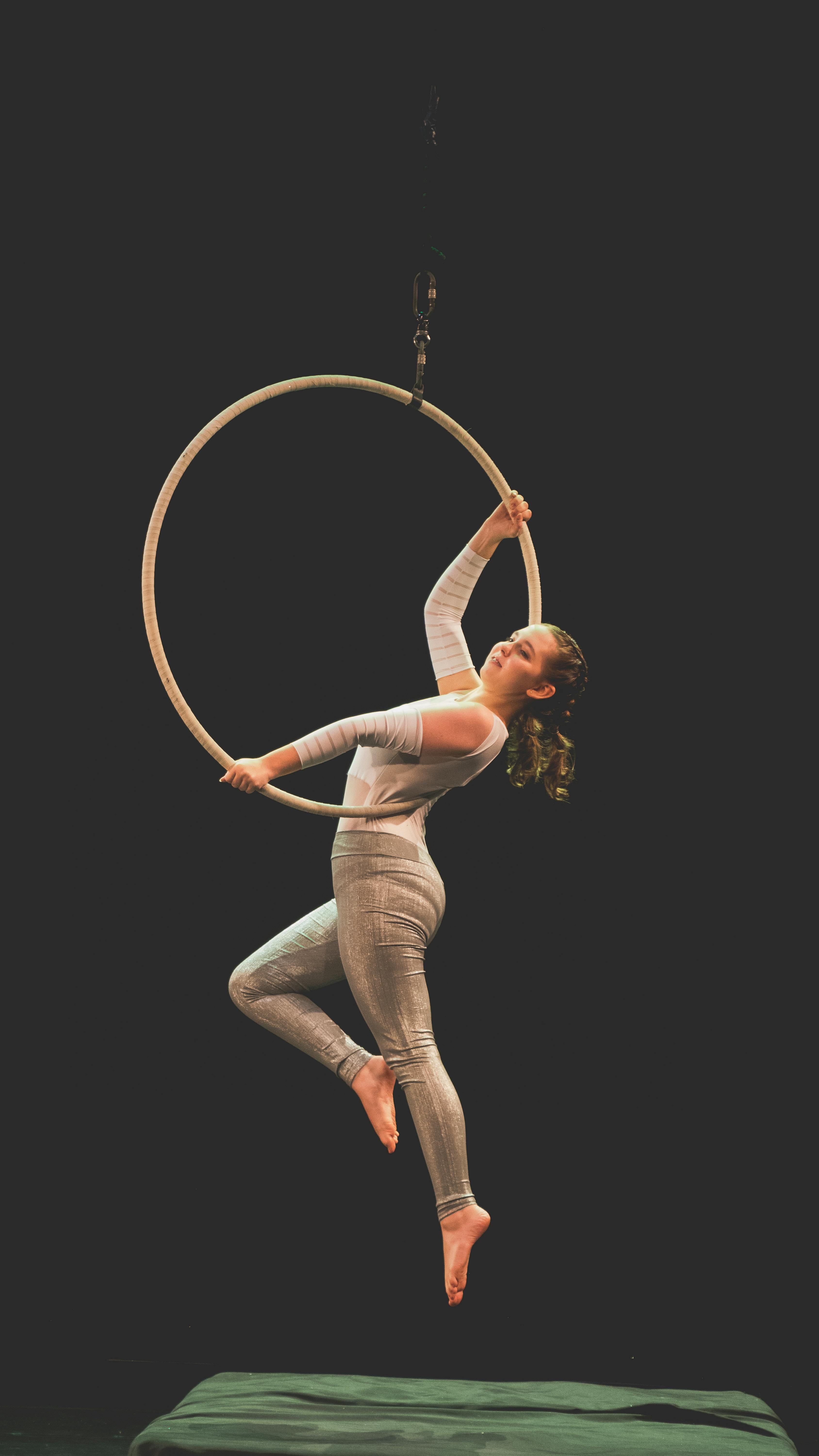 Captivating Aerial Dance Performance on Hoop · Free Stock Photo