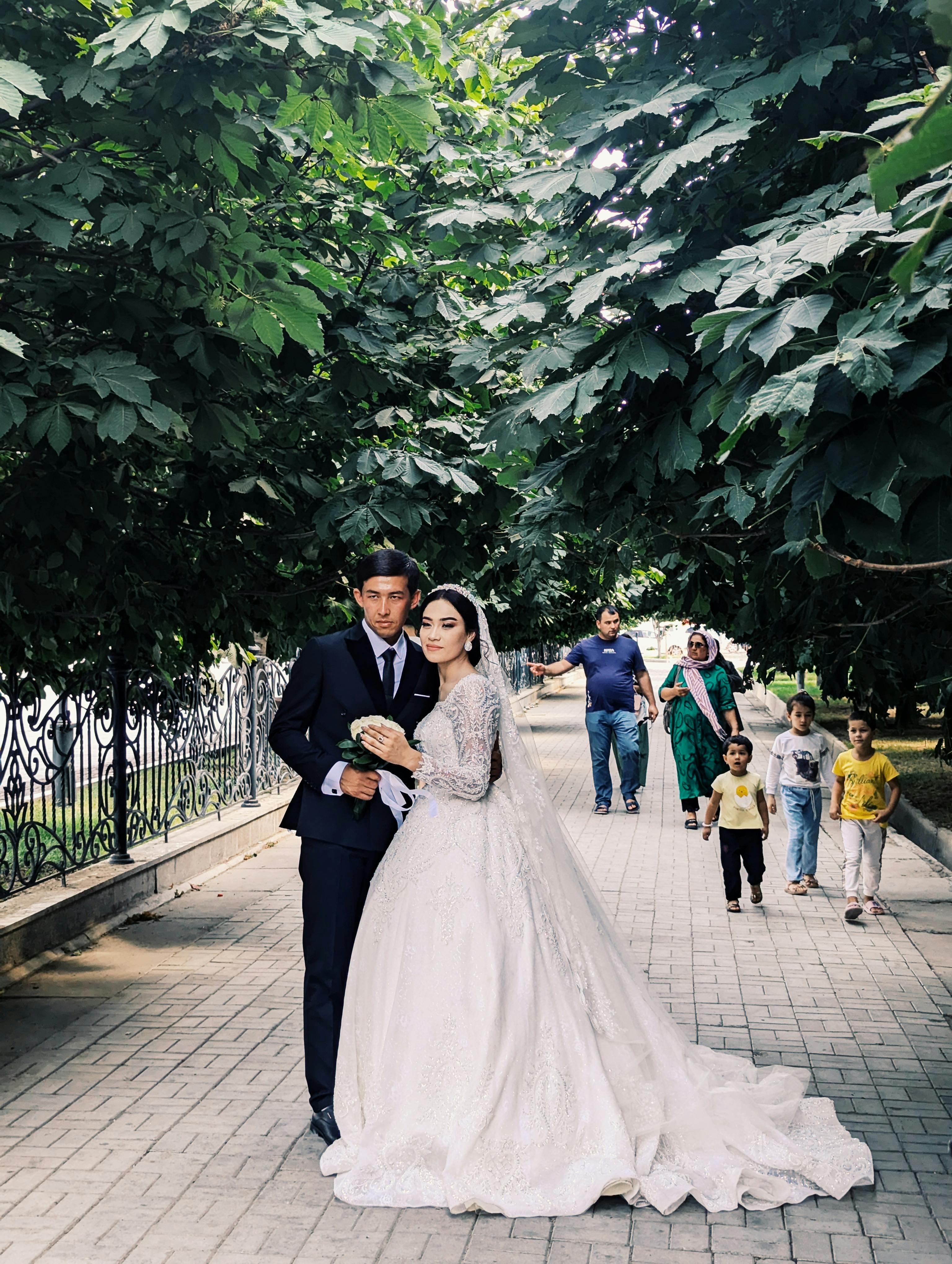 Elegant Outdoor Wedding Portrait in Summer · Free Stock Photo