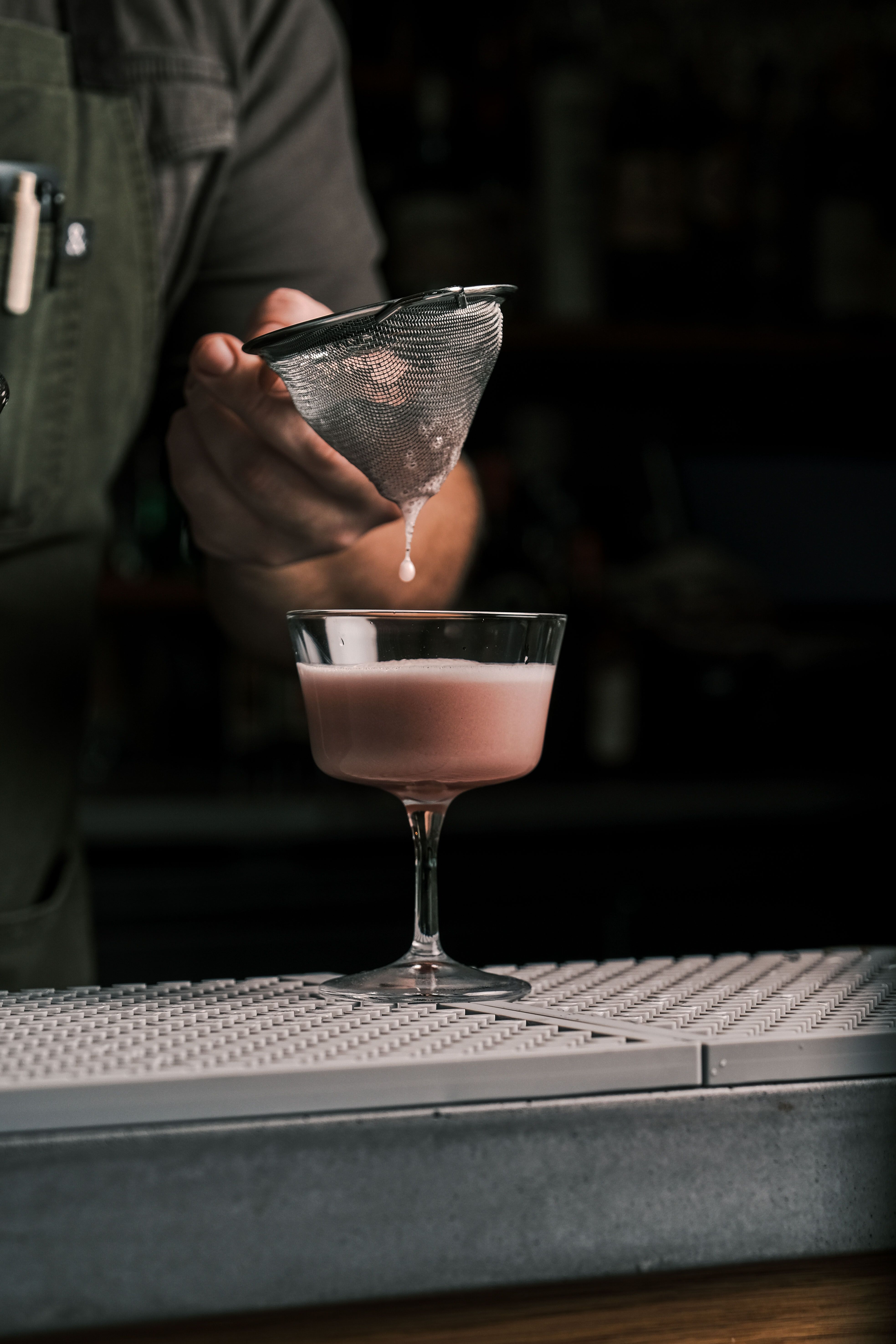 Close-up of a Bartender Preparing a Cocktail · Free Stock Photo