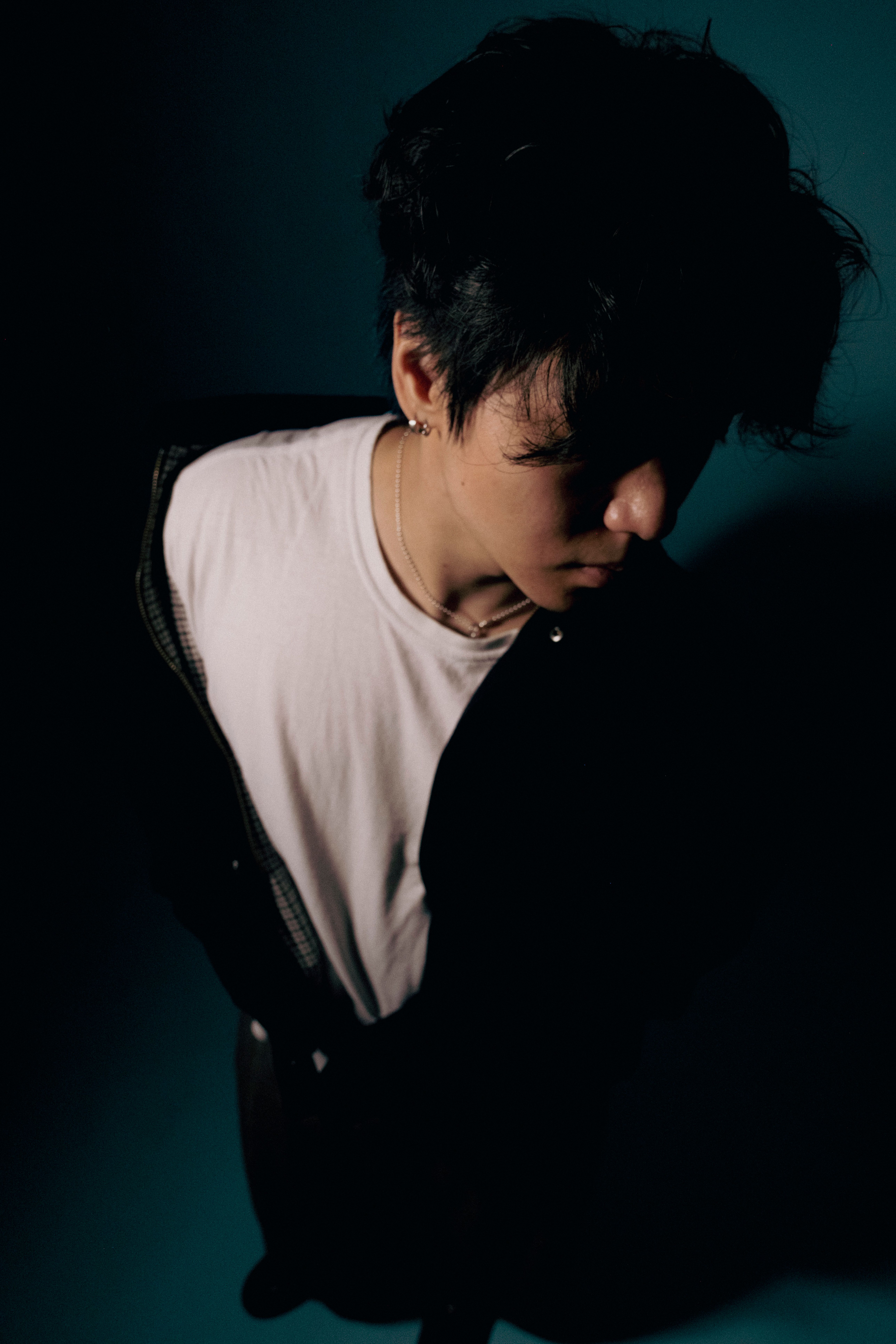 Moody Artistic Portrait in Low Light · Free Stock Photo