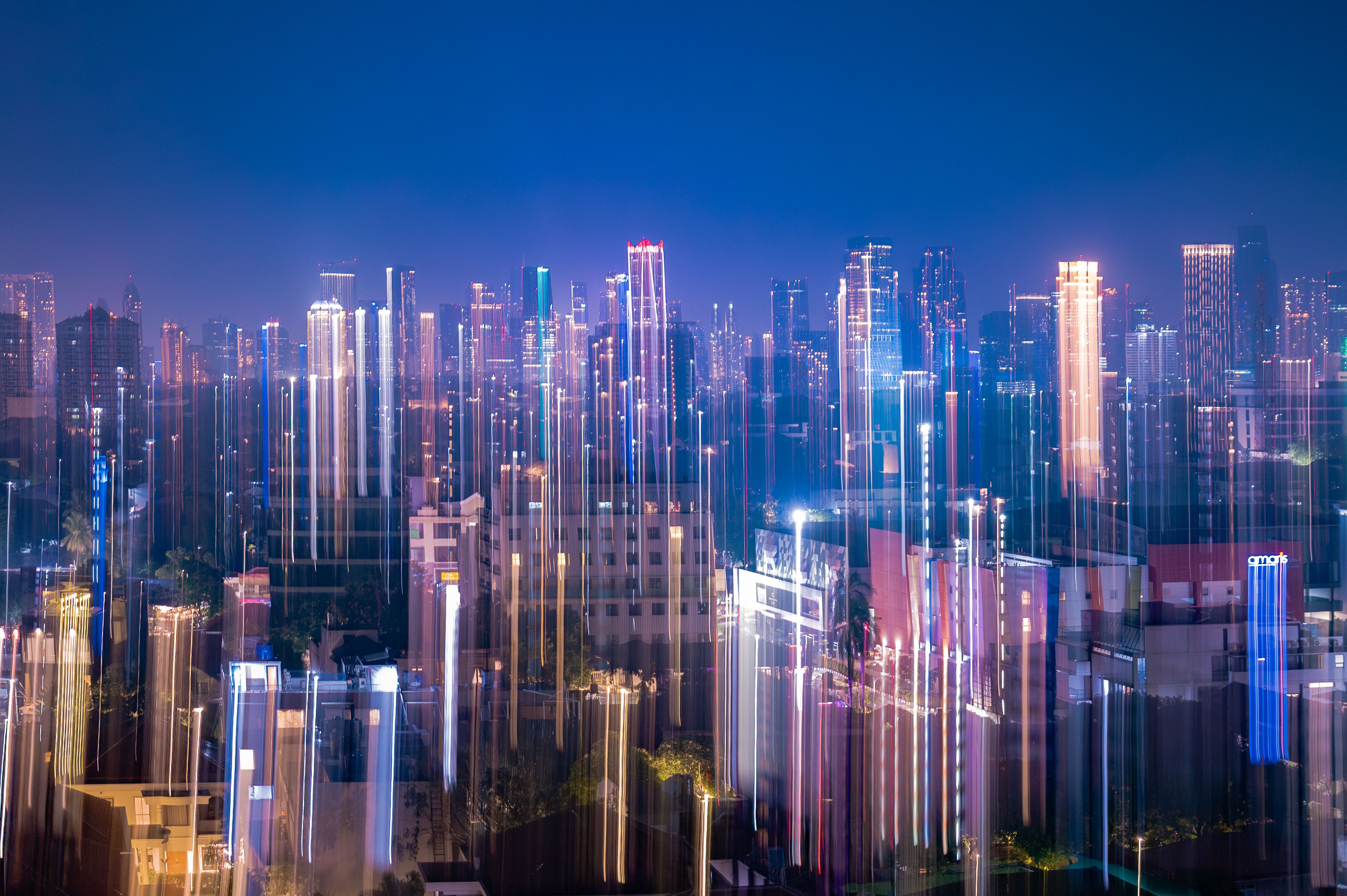 Vibrant Jakarta Night Skyline with Light Streaks · Free Stock Photo