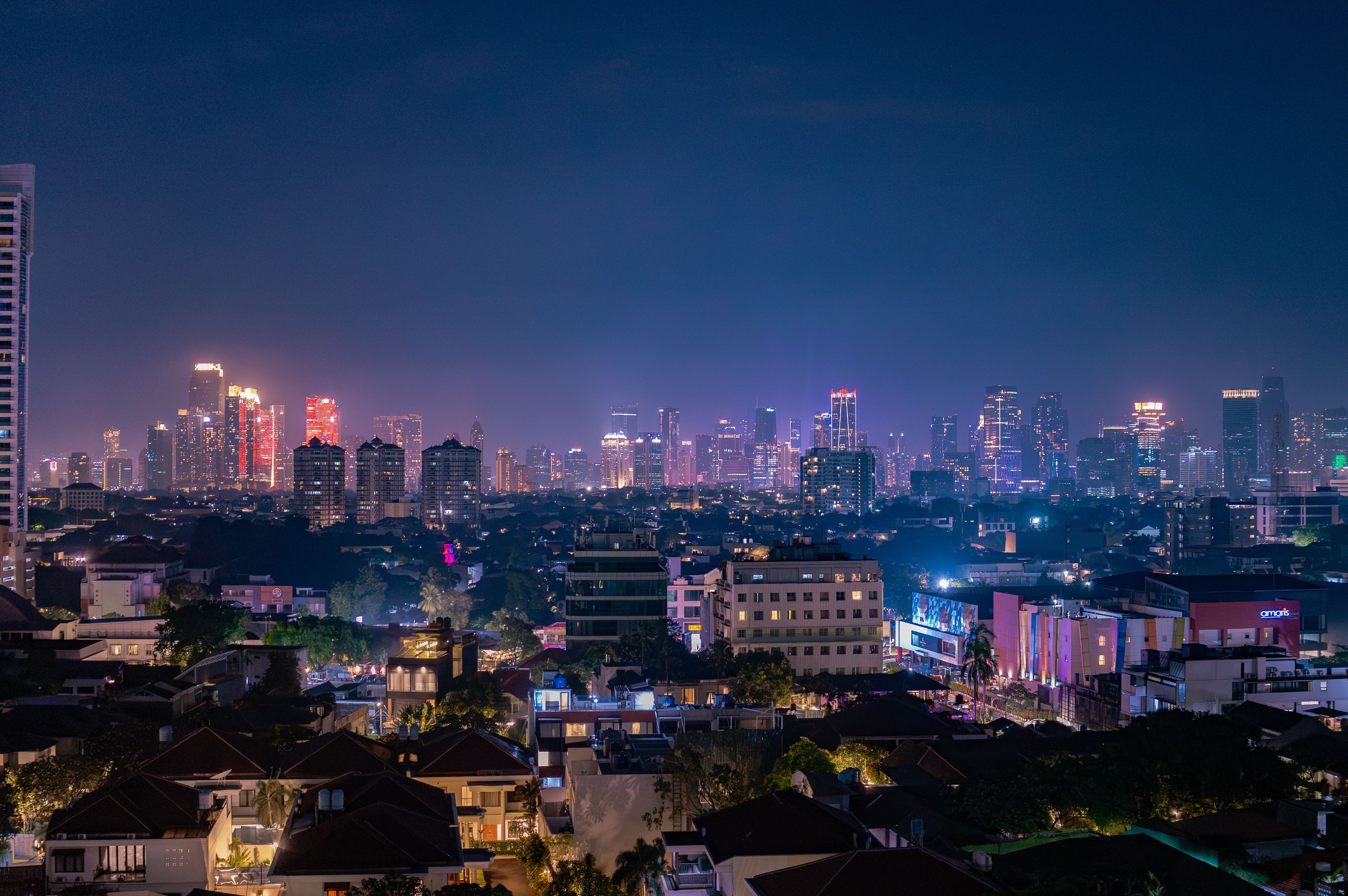 Vibrant Jakarta Night Skyline with Neon Glow · Free Stock Photo