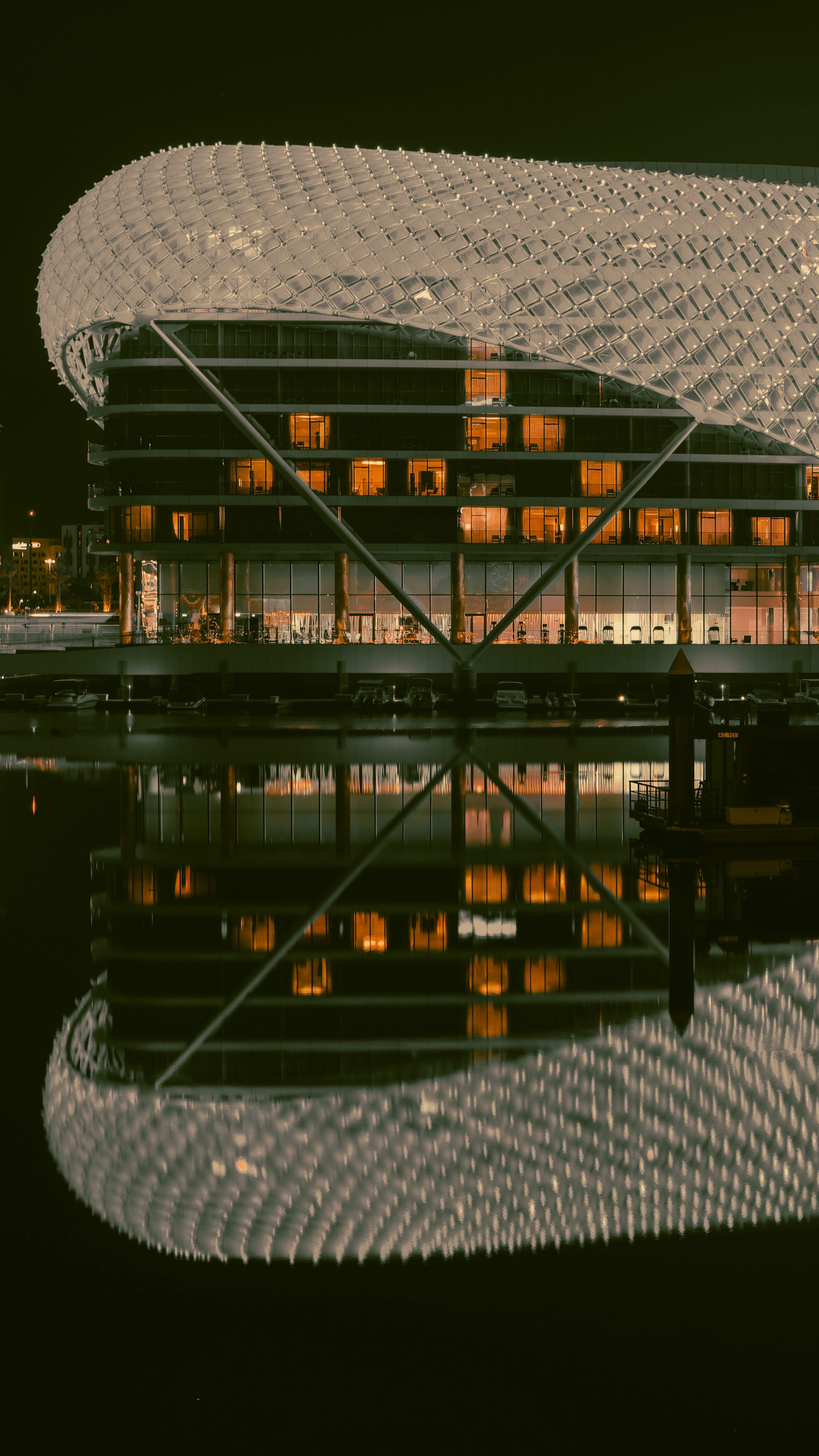 Modern Architectural Building at Night with Reflection · Free Stock Photo