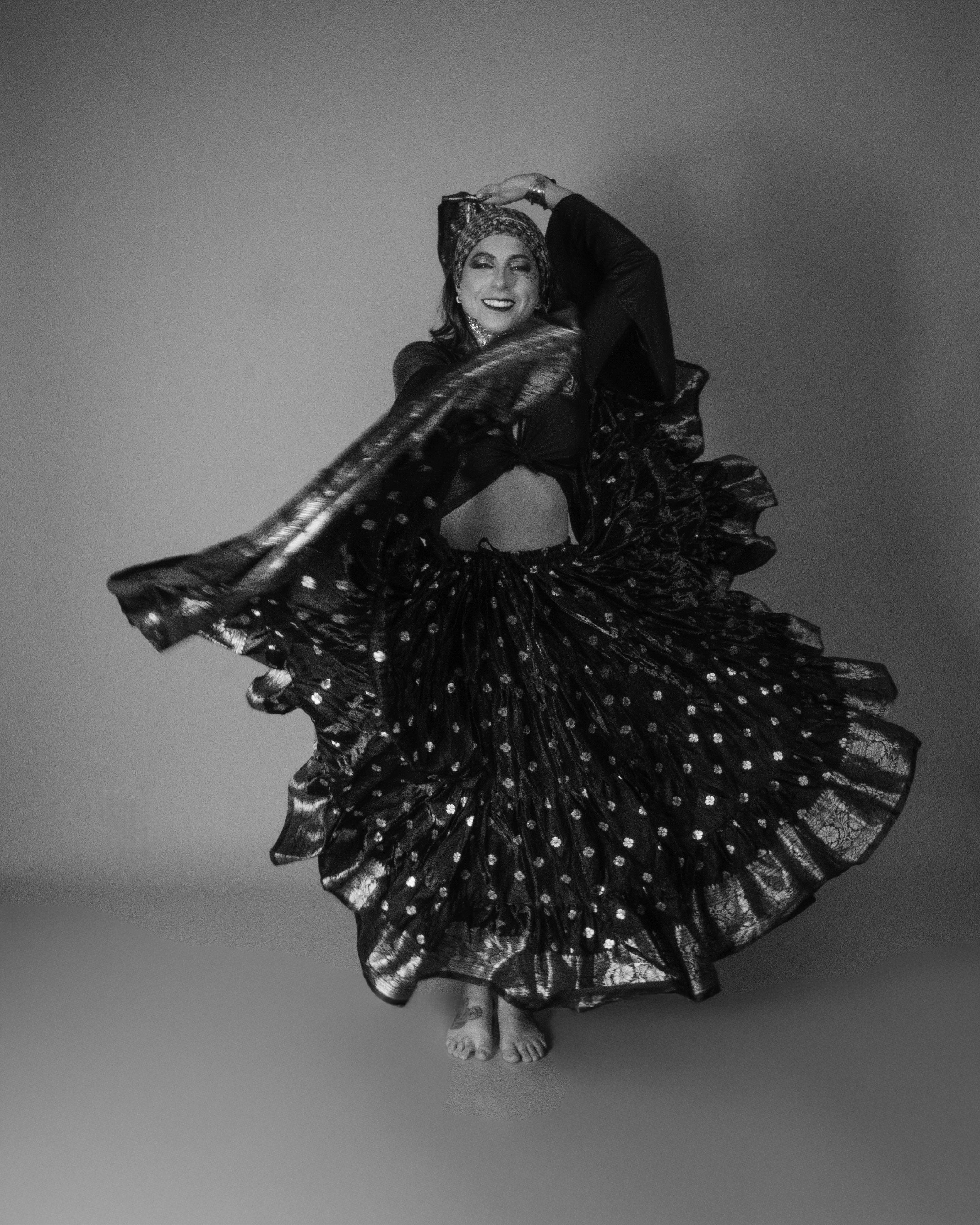 Enchanting Romani Dancer in Traditional Costume · Free Stock Photo