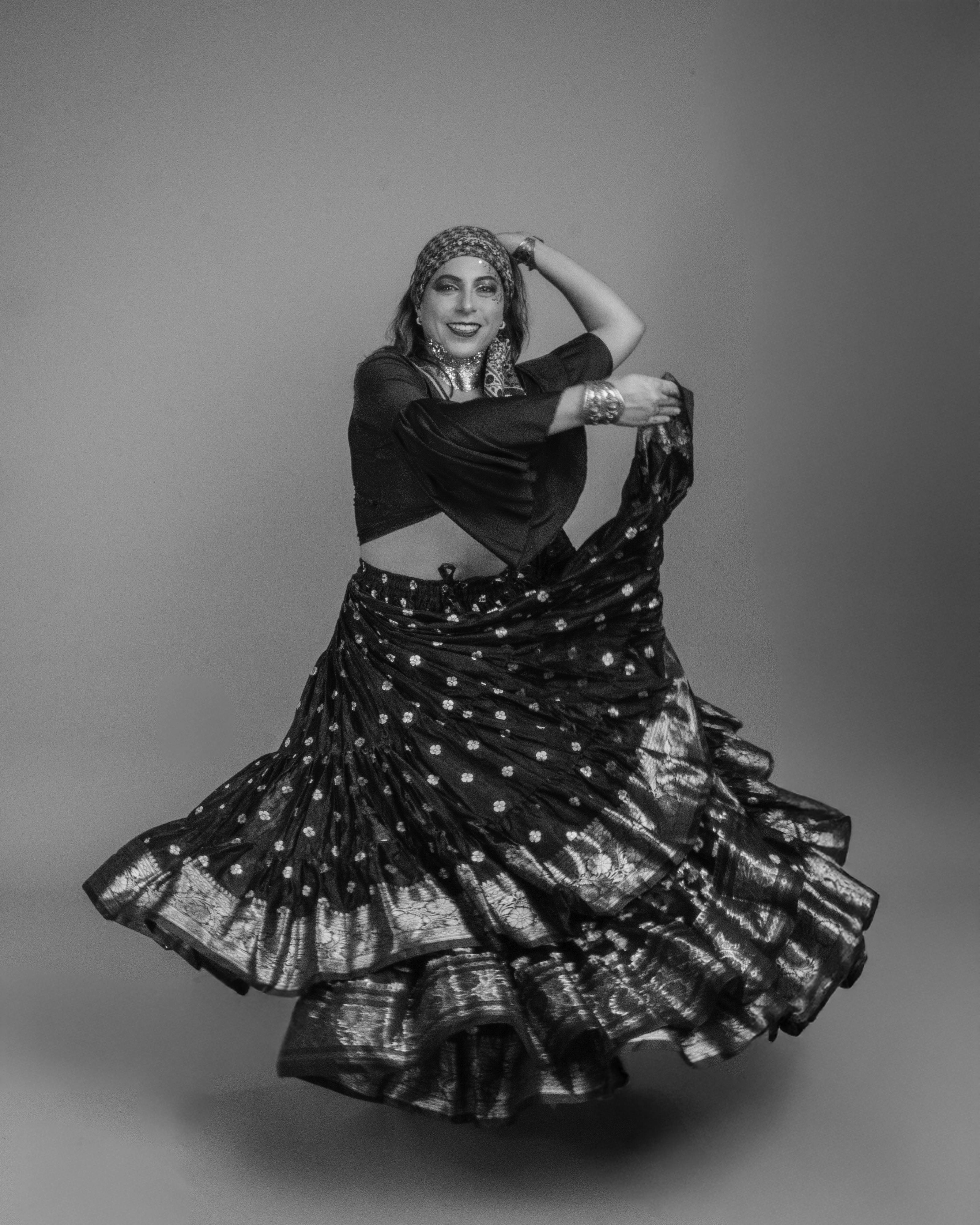 Elegant Gypsy Dance in Traditional Attire · Free Stock Photo