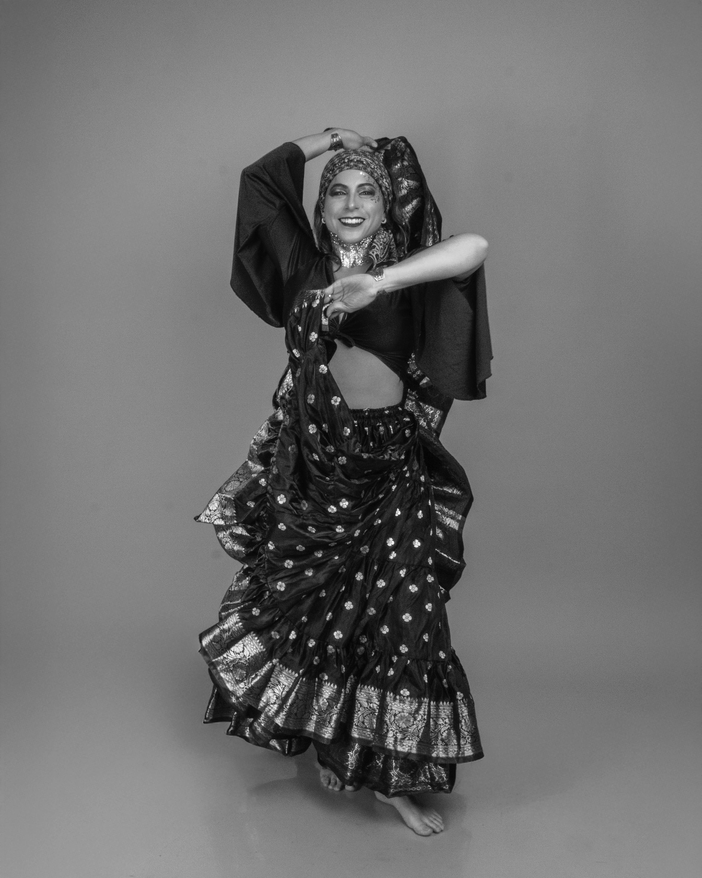 Traditional Romani Dance Performance in Black and White · Free Stock Photo