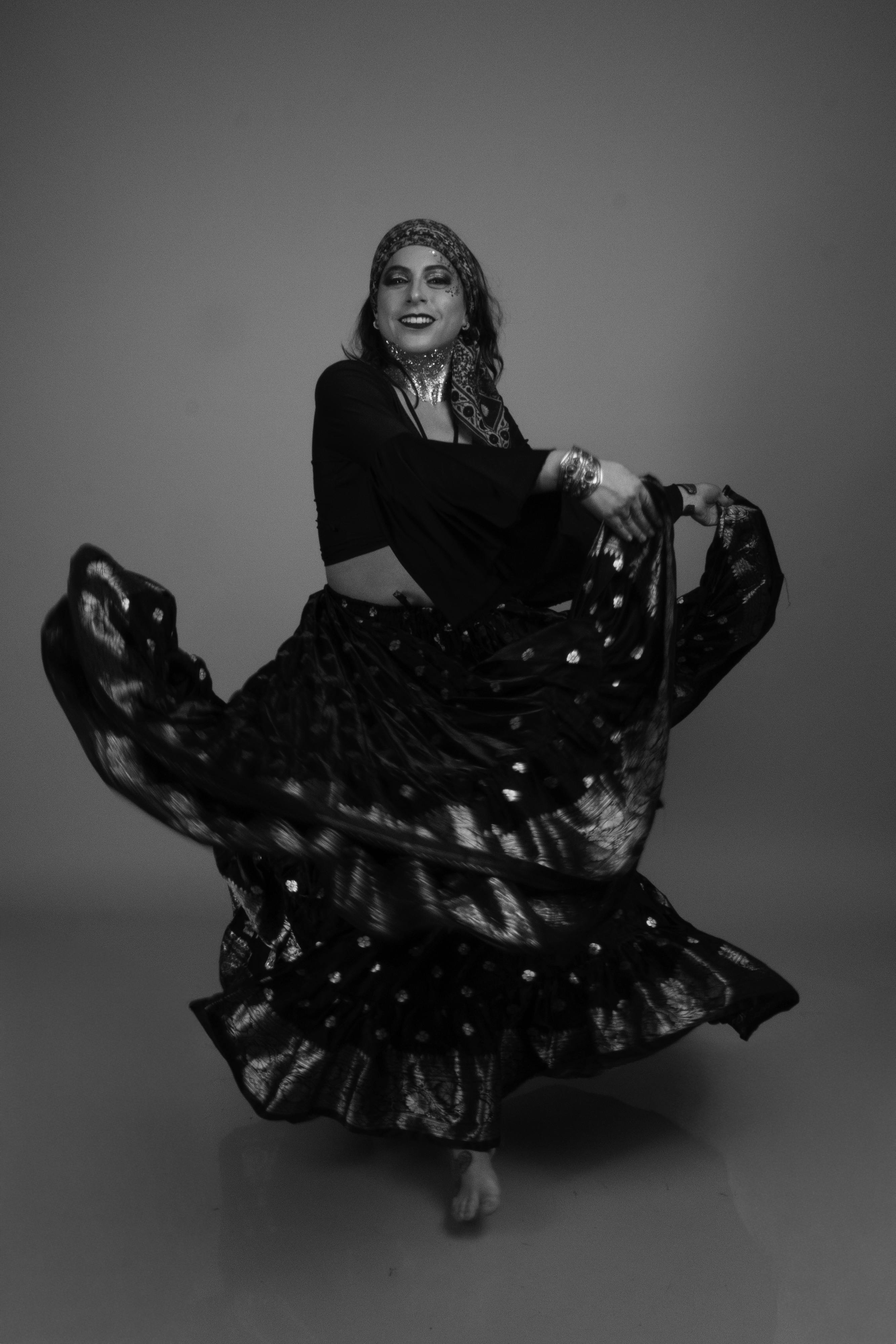 Dynamic Romani Dance Performance in Motion · Free Stock Photo