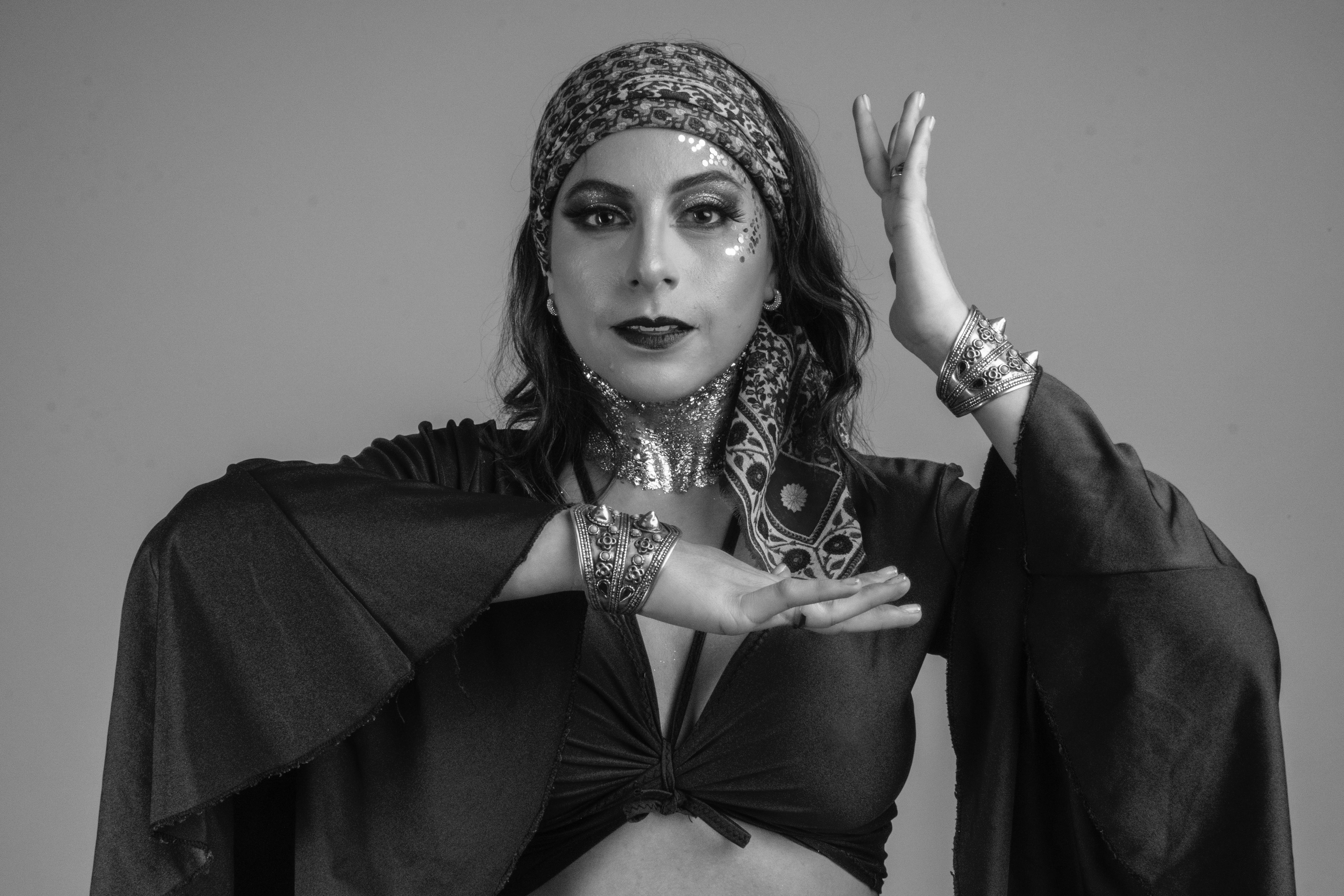 Captivating Portrait of a Female Dancer in Gypsy Attire · Free Stock Photo