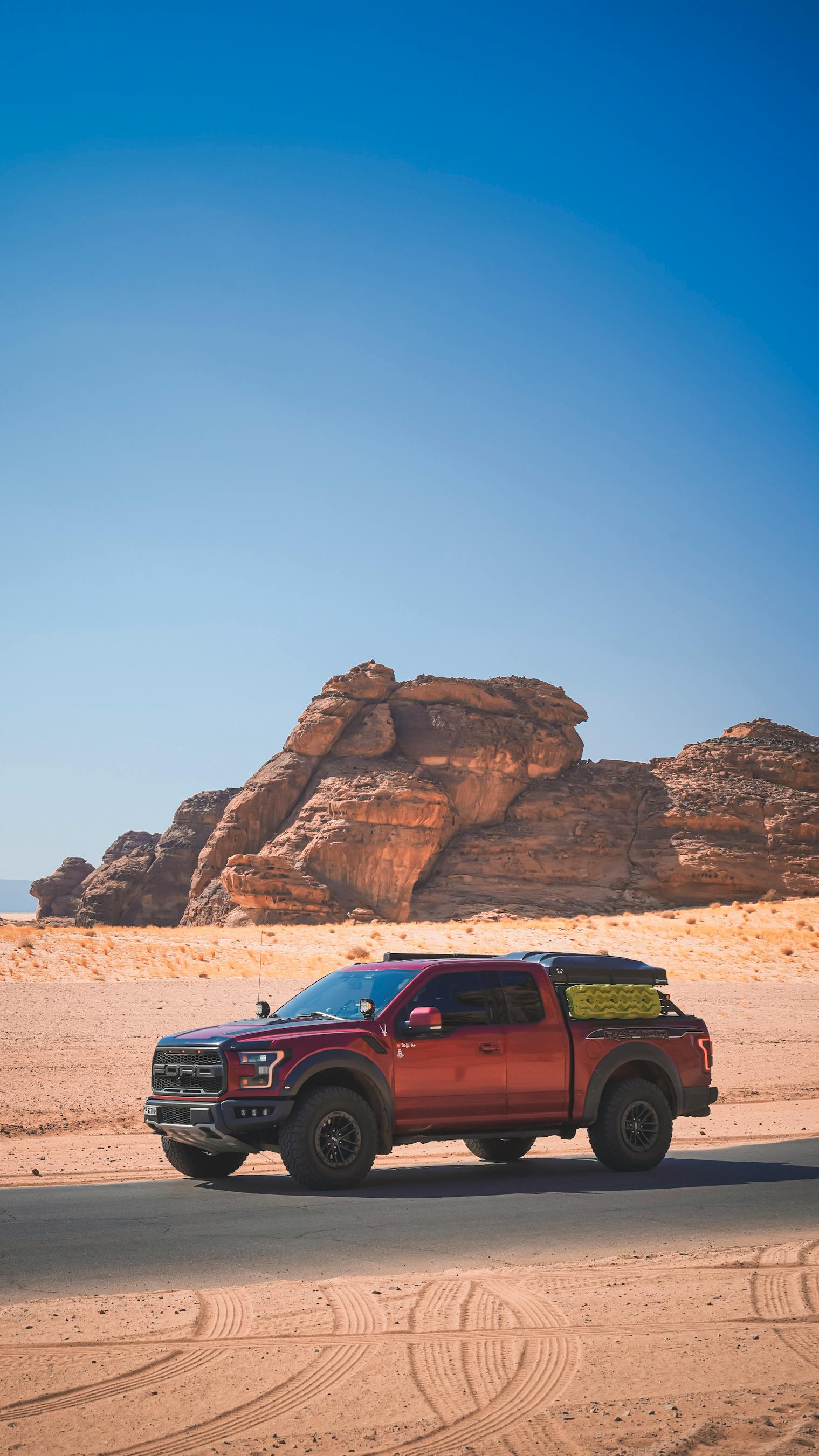 Red Pickup Truck in Desert Landscape · Free Stock Photo