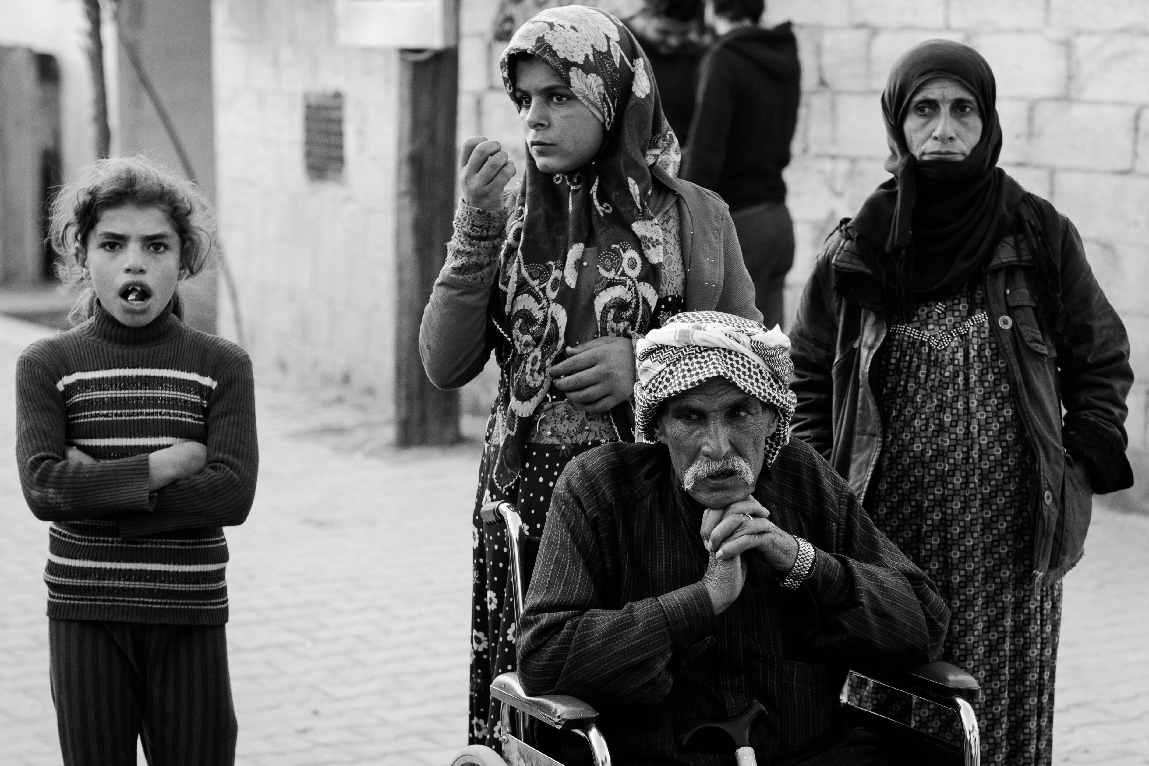 Portrait of a Syrian Family in Traditional Attire · Free Stock Photo