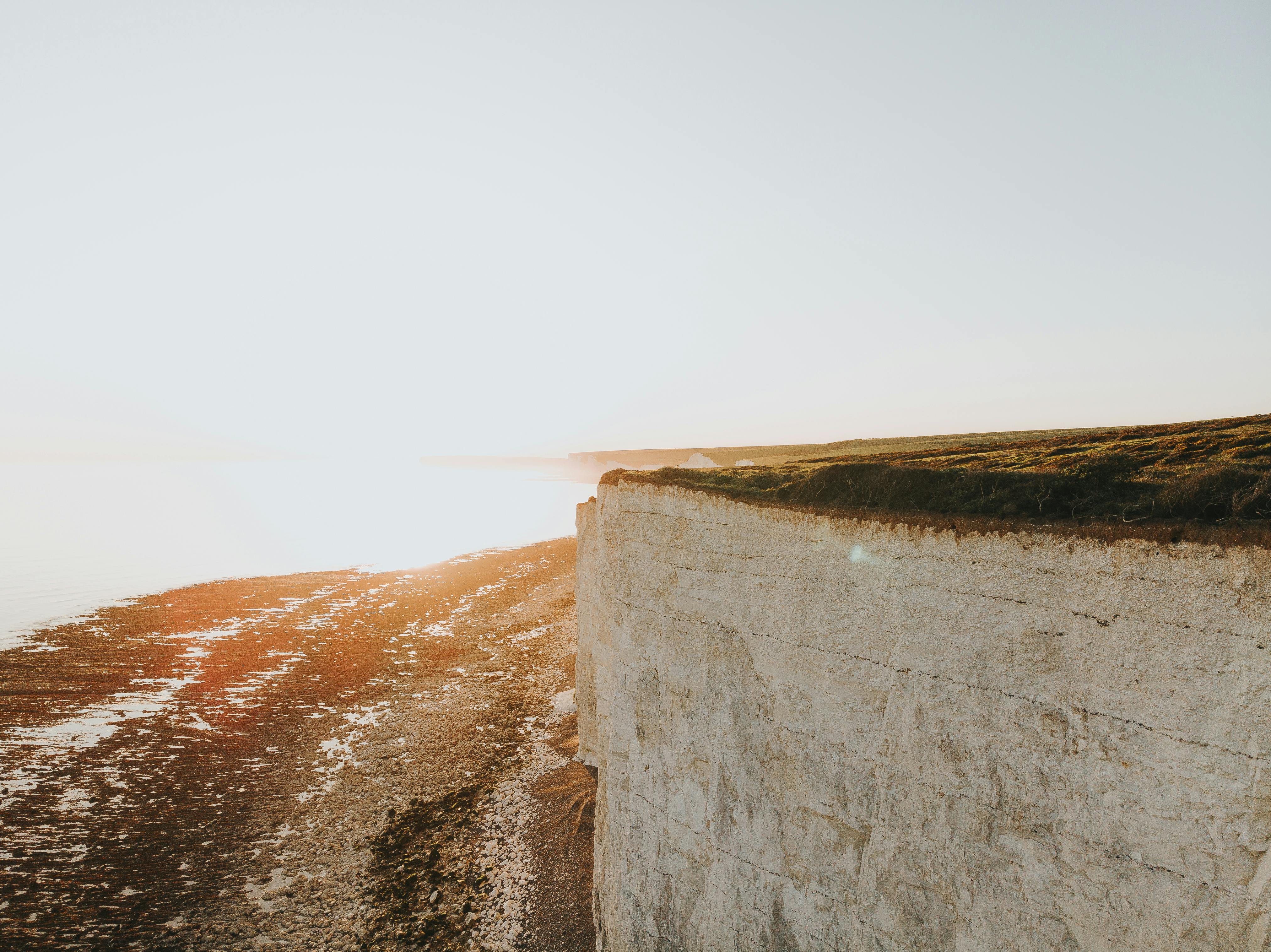 Aerial Photo of Cliff Near Seashore · Free Stock Photo