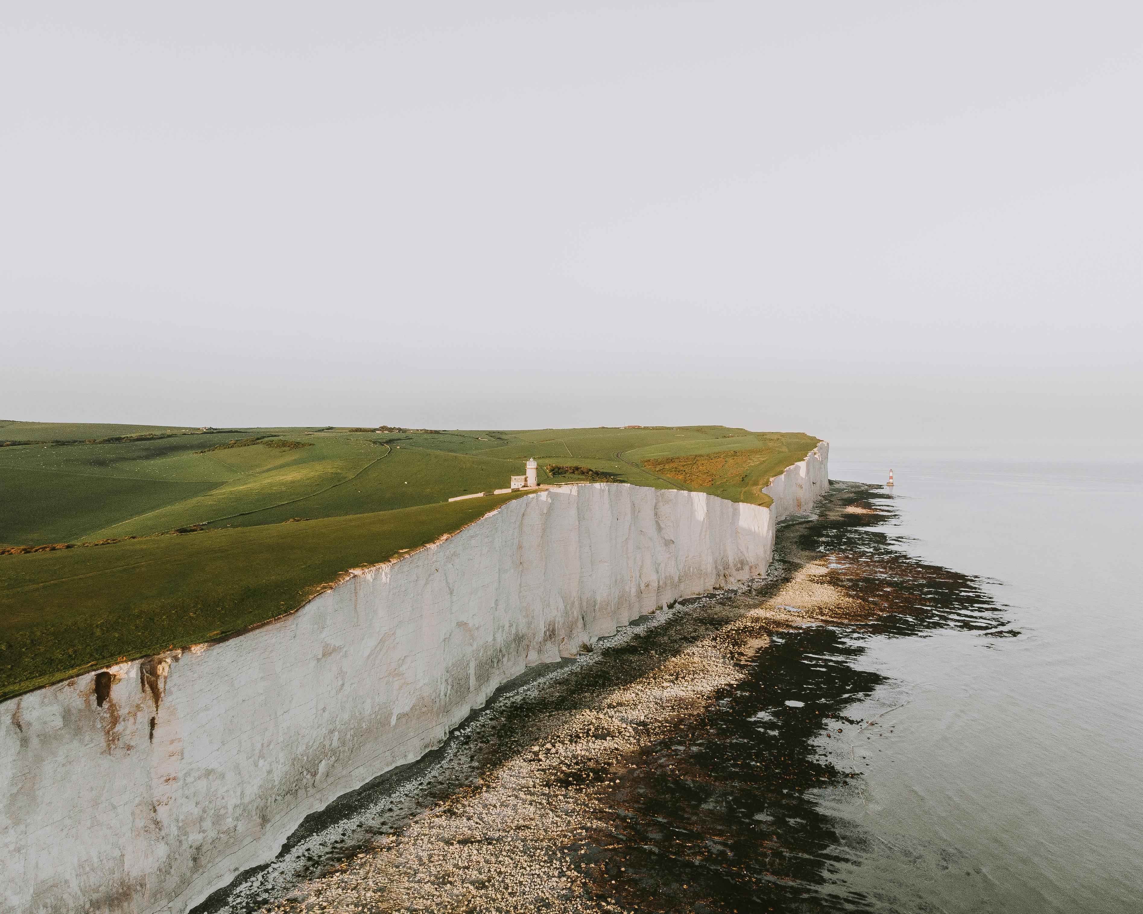 Aerial Photo of Cliff Near Seashore · Free Stock Photo