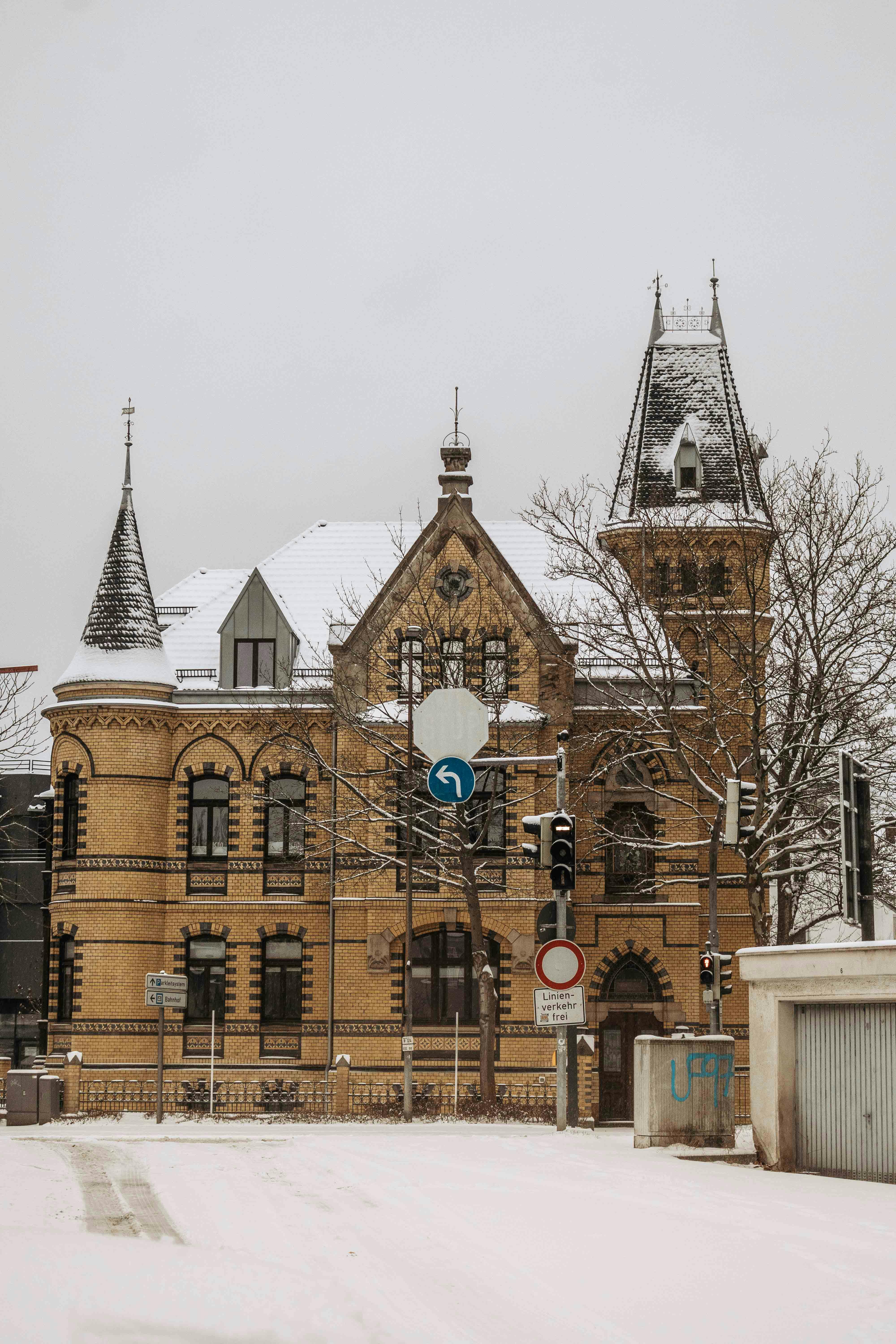 Historic Snow-Covered Building in Winter · Free Stock Photo